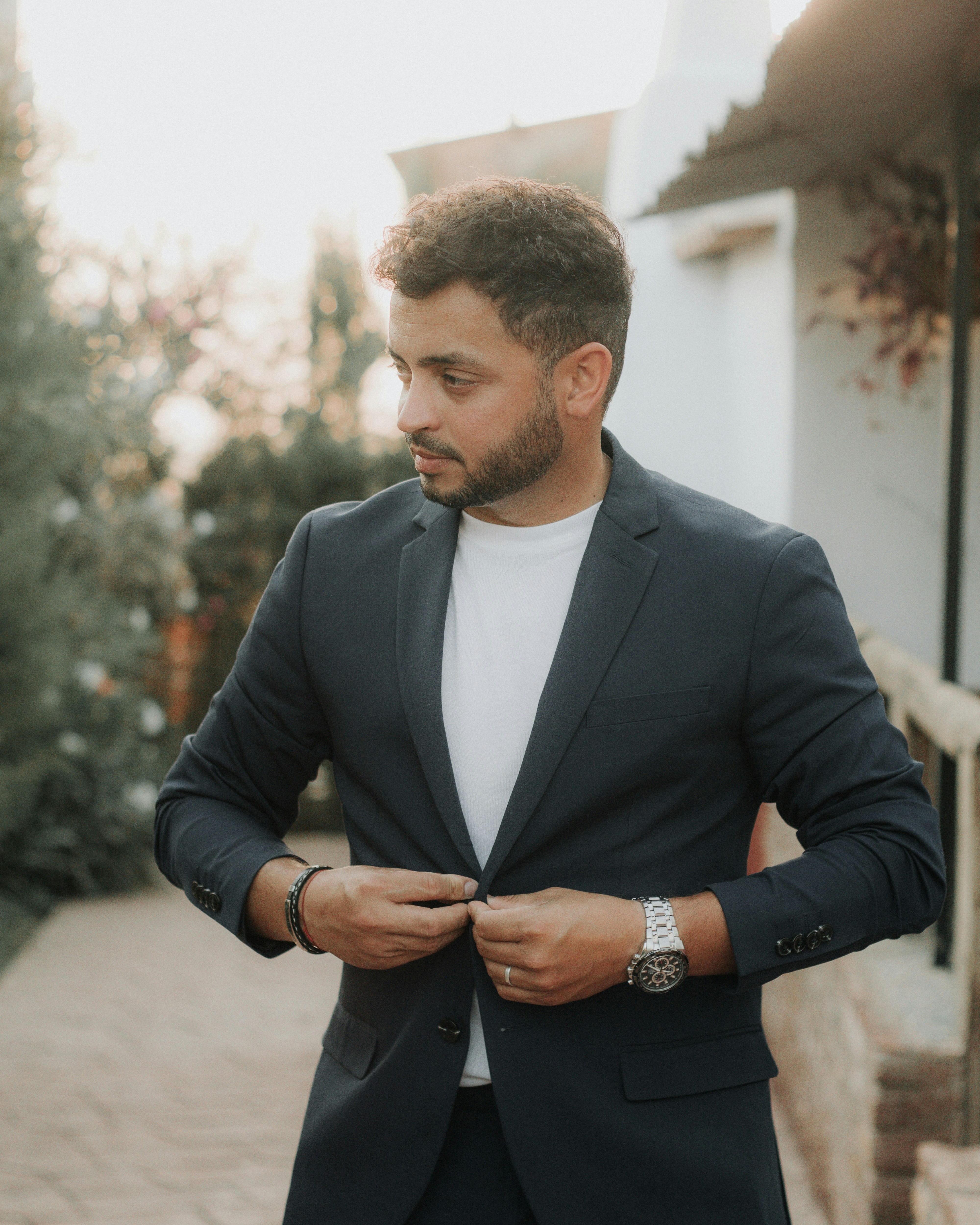 Tailored in the Dusk: A Quiet Portrait Under Garden Light