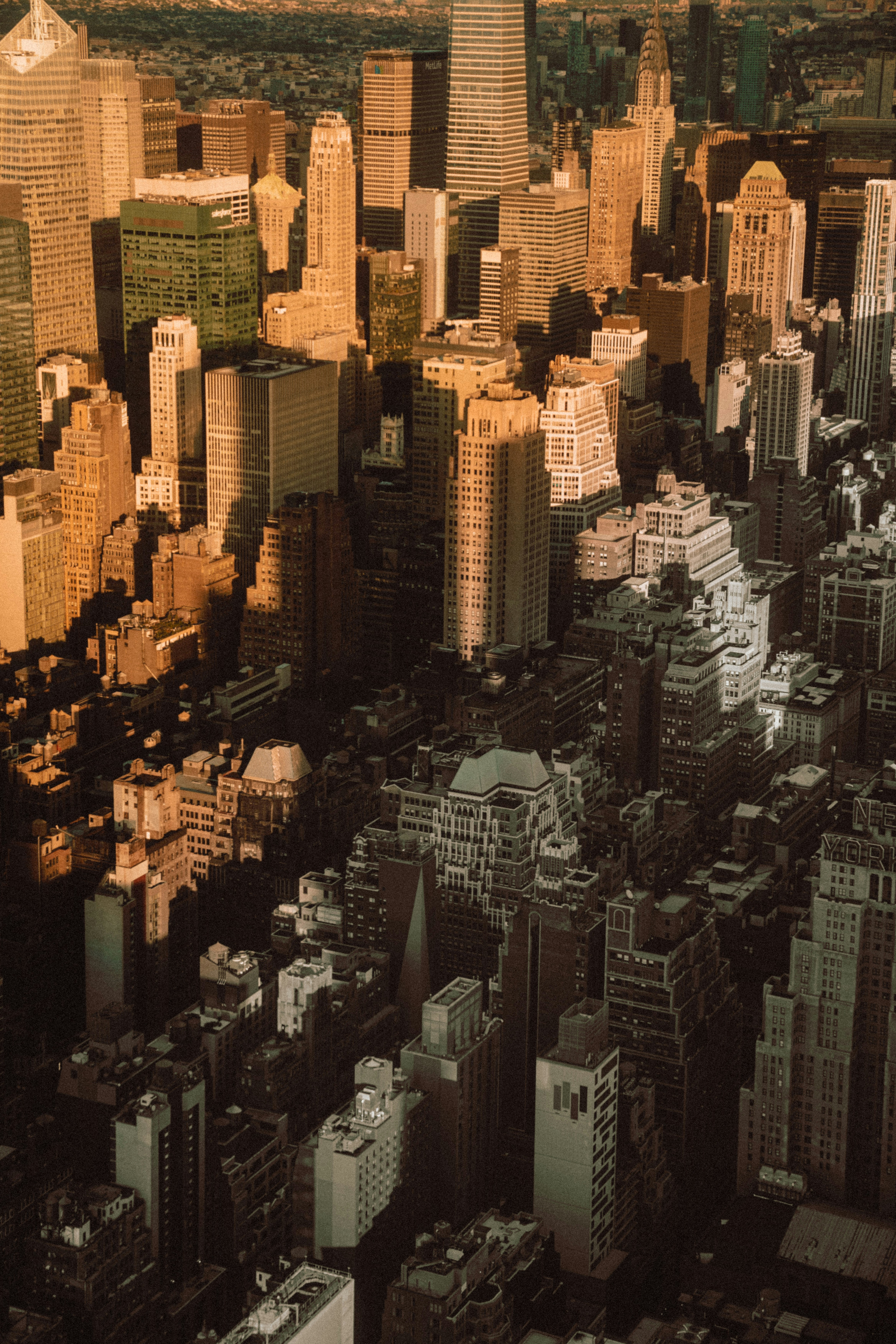 Golden Grid: An Aerial Portrait of a Sunlit Cityscape