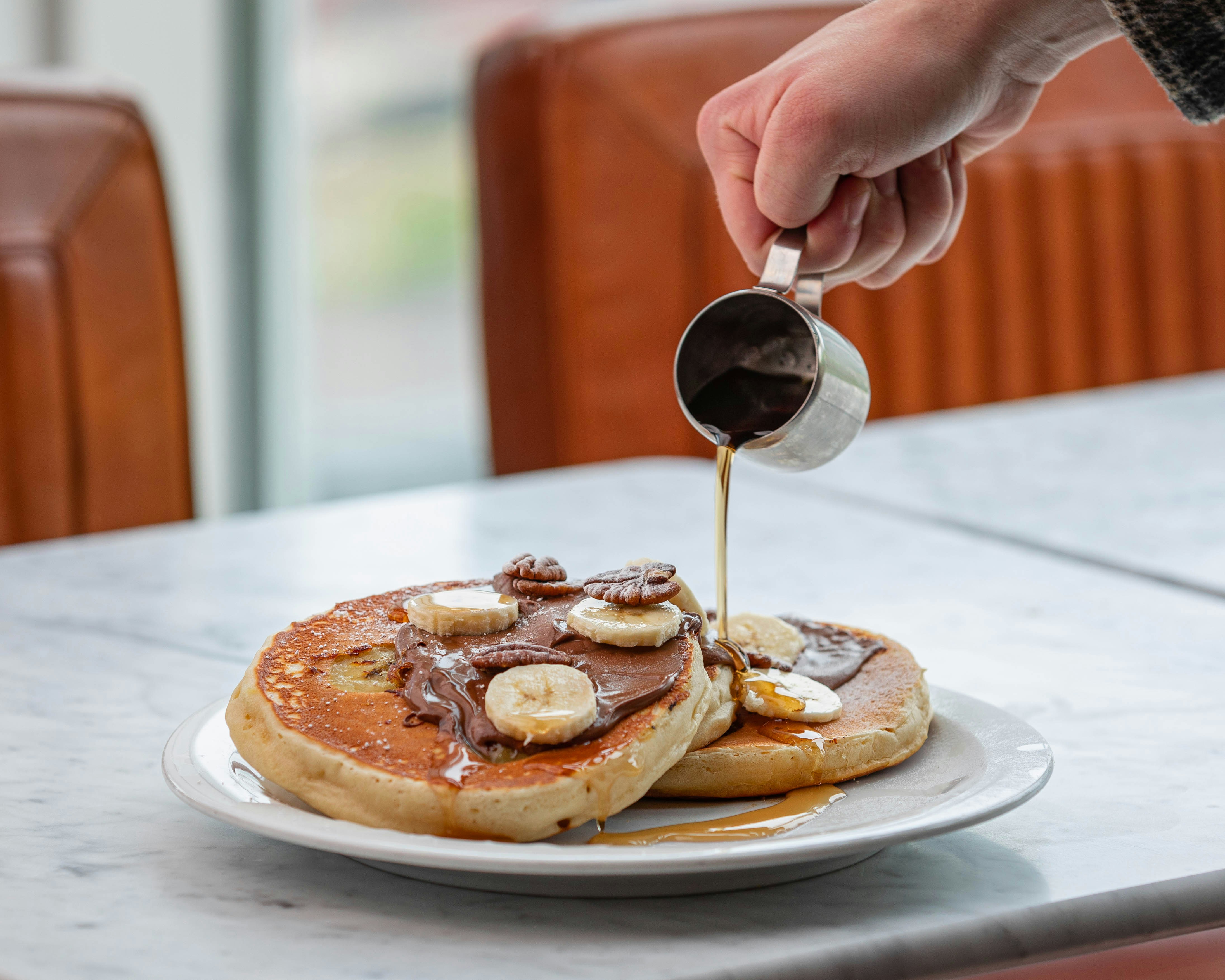 Syrup pour on banana & nutella pancakes