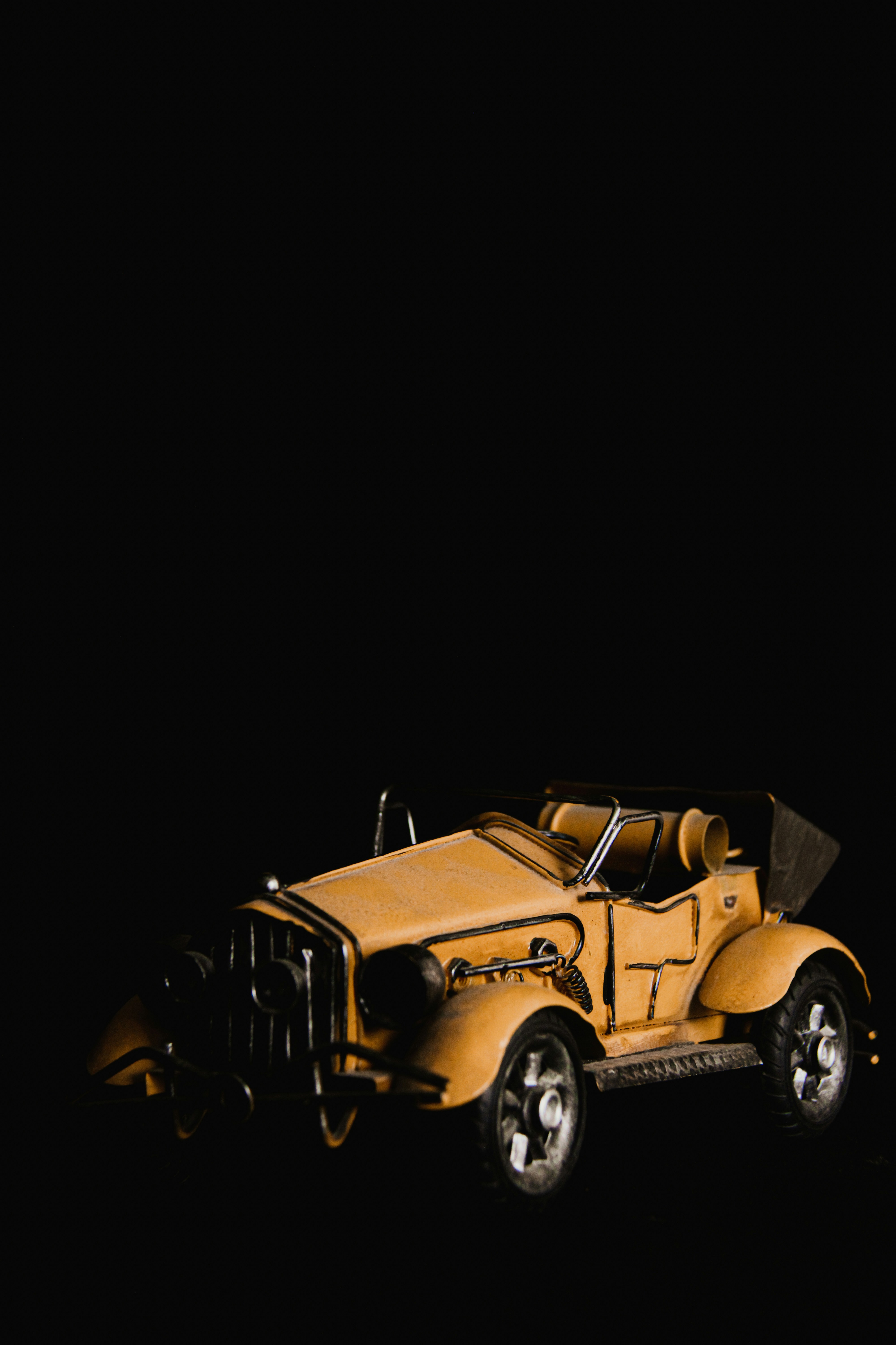 Amber Vintage: a miniature roadster under a velvet night
