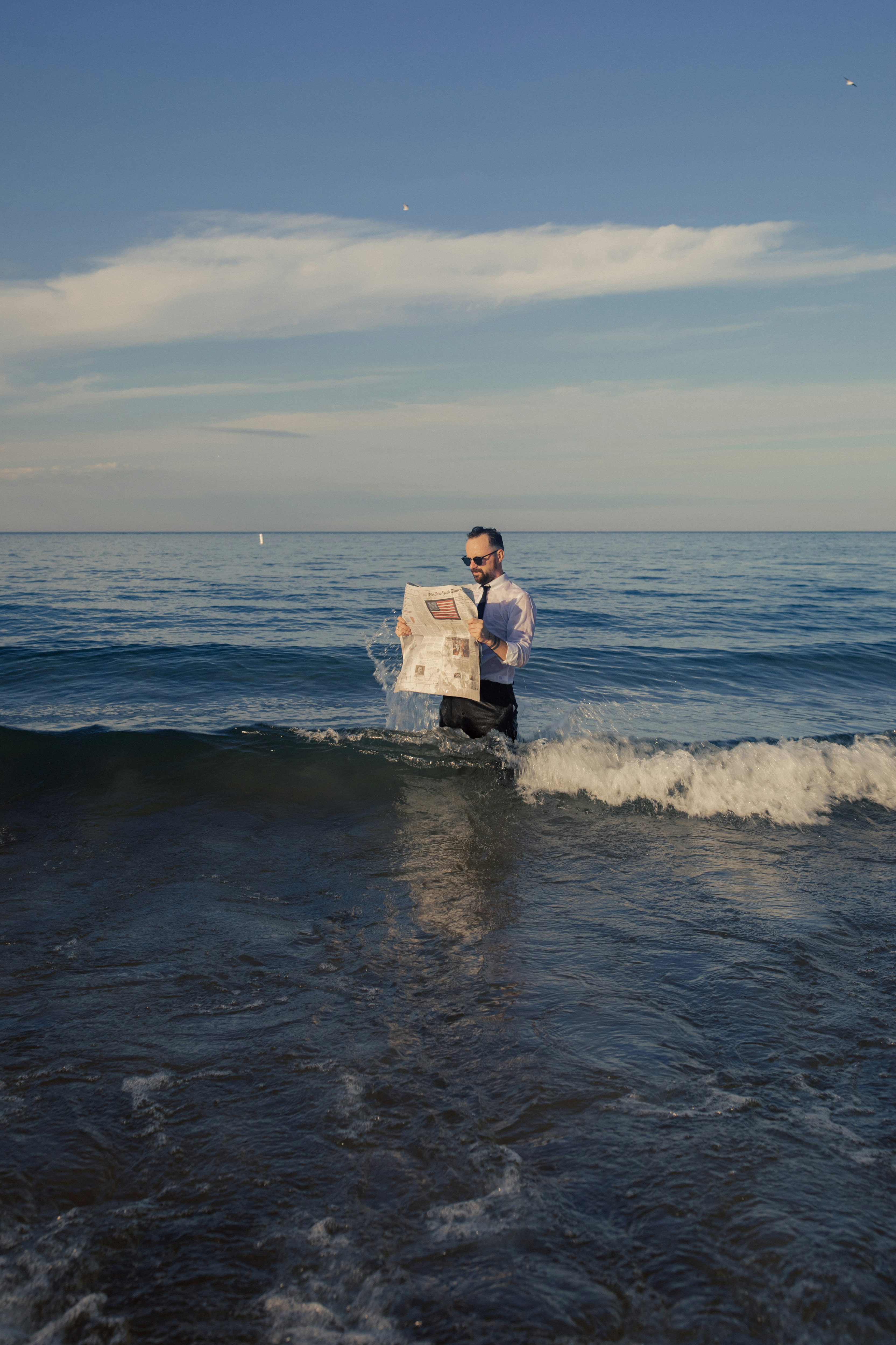 Tidepaper Moment: A Gentleman Reads the News at Sea