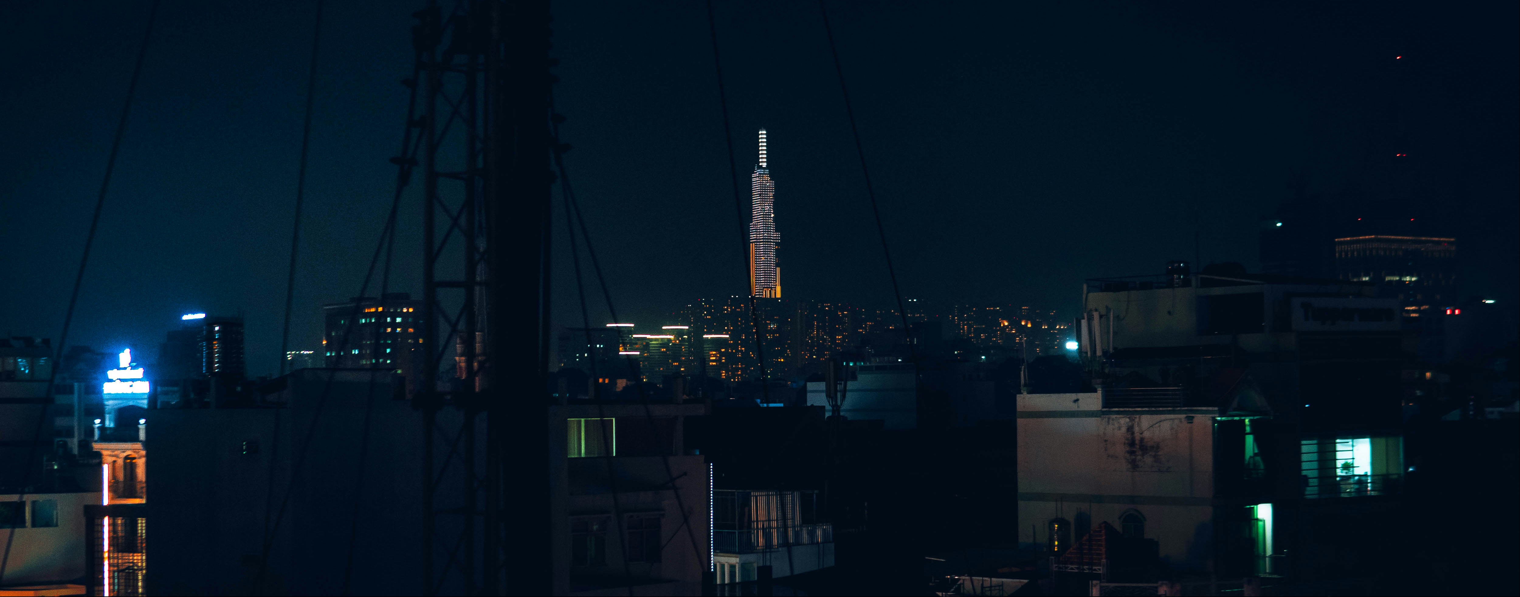 Spirelit Vigil: The Night Crown of a Blue City