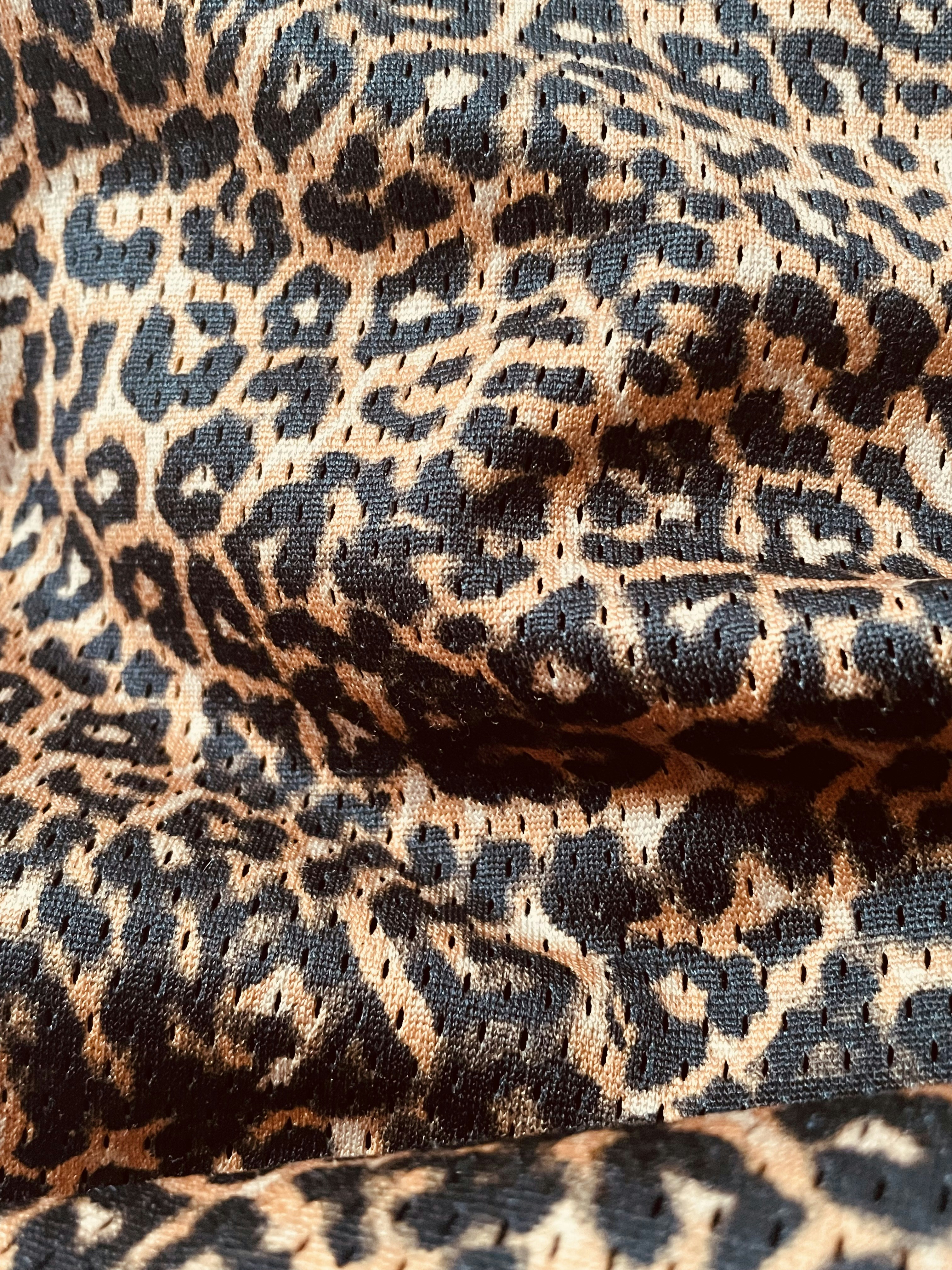 Leopard Print Close-Up: Texture and Folds in Soft Fabric