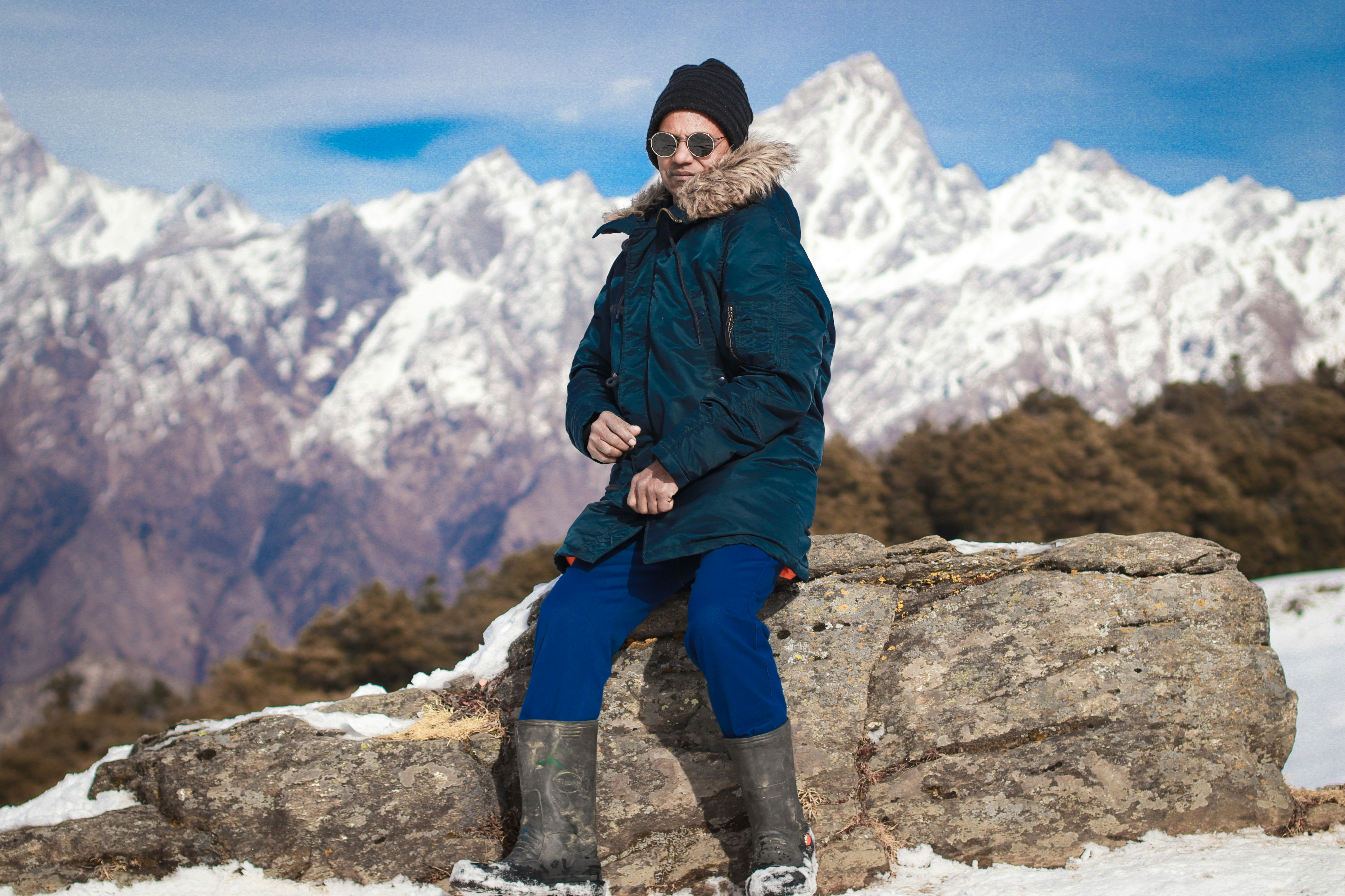 Winter Warrior on Rocky Preserve Against Alpine Backdrop