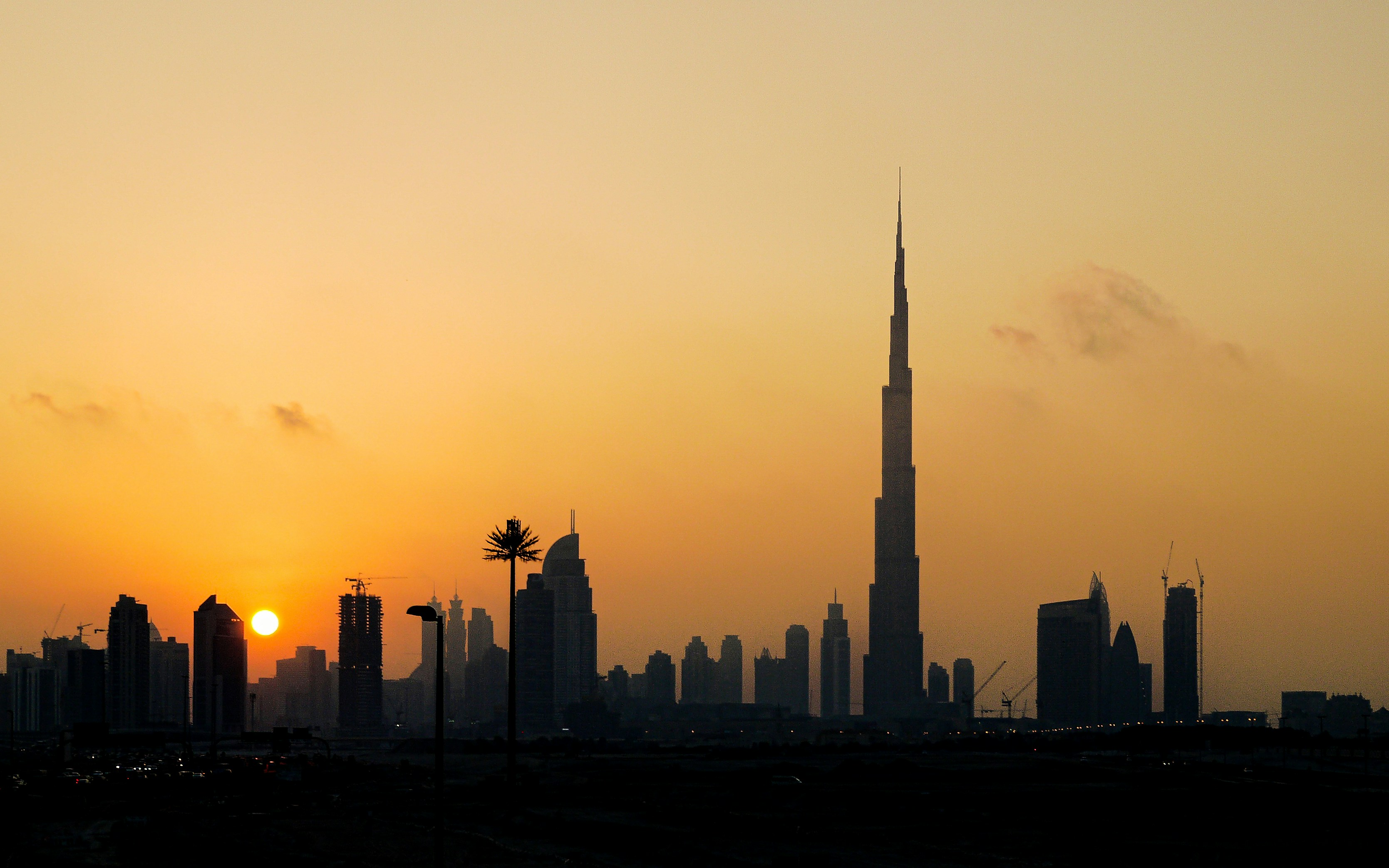 A city skyline with the sun setting photo – Free Dubai - united arab ...