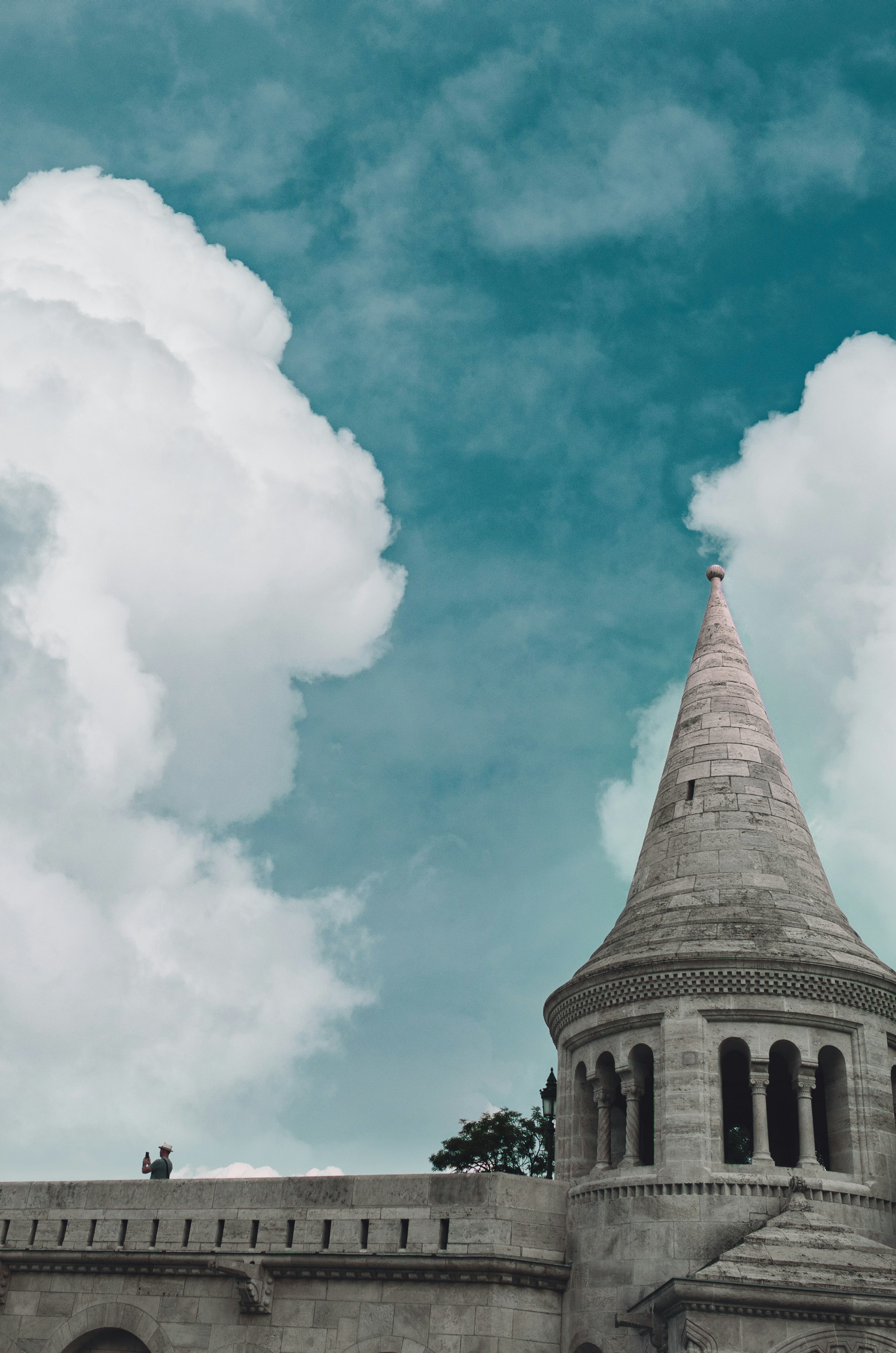 Crowned Turret Against Turquoise Skies