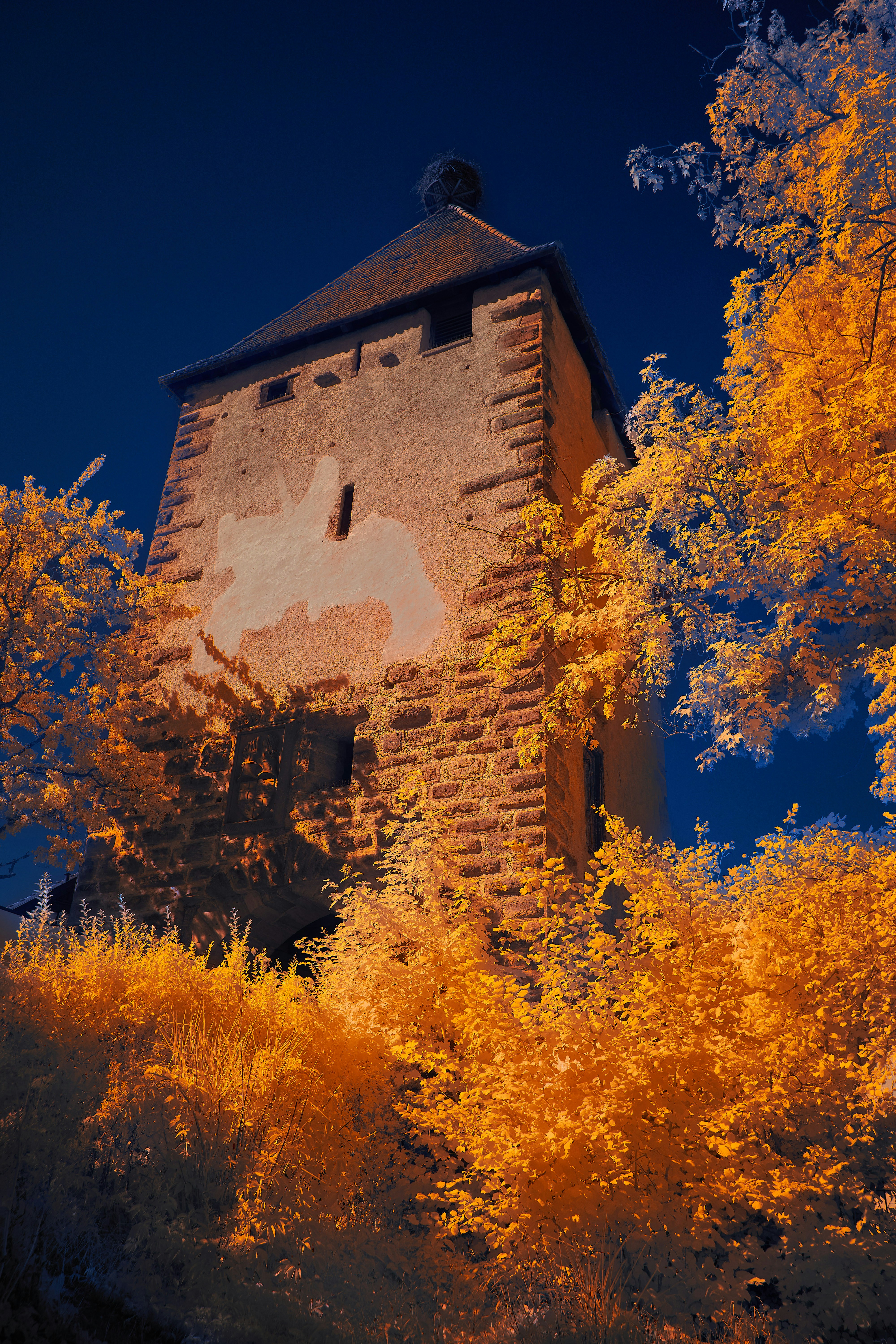 Ember-Glow Tower Against Velvet Night