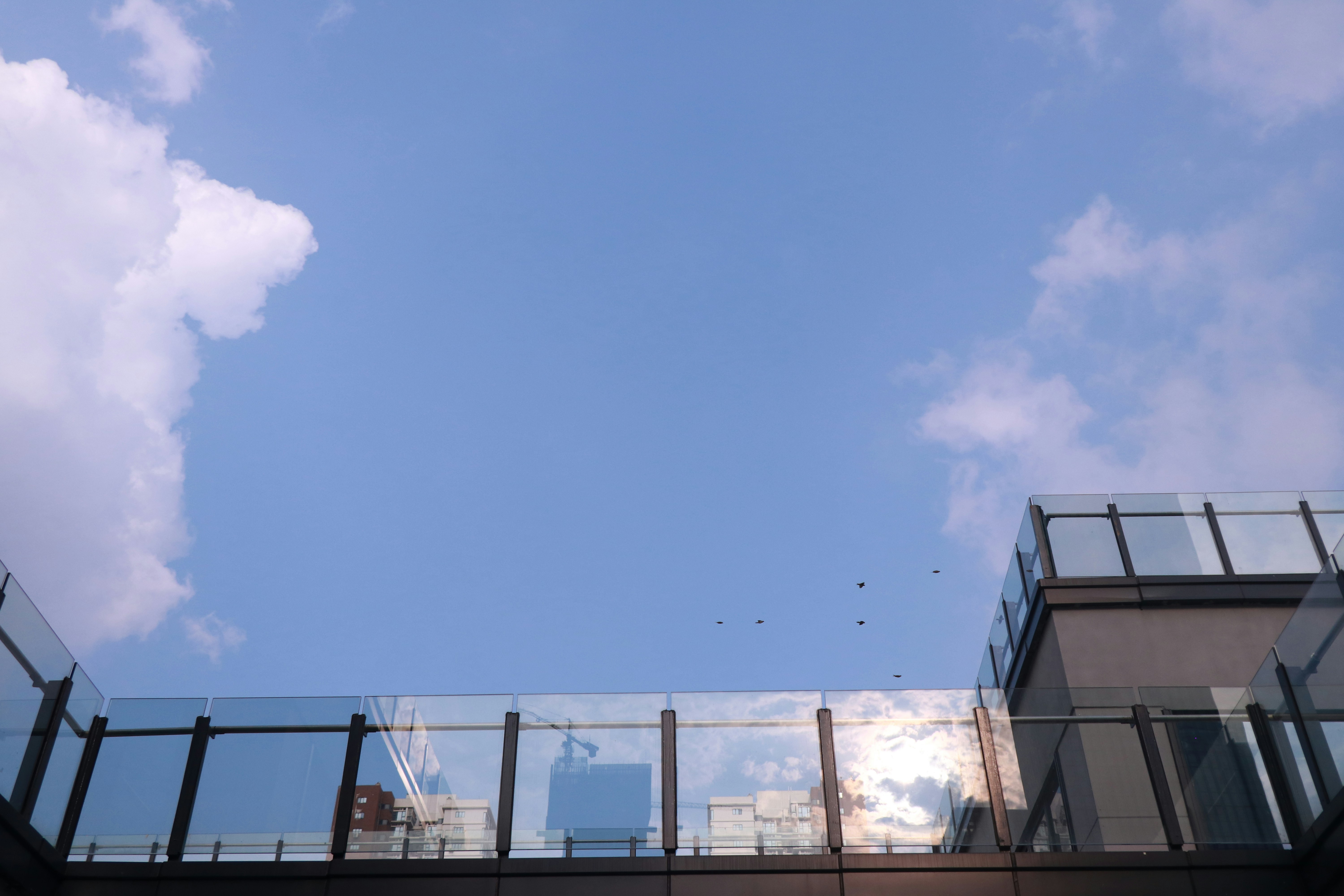 A building with a fence around it photo – Free Shenzhen Image on Unsplash