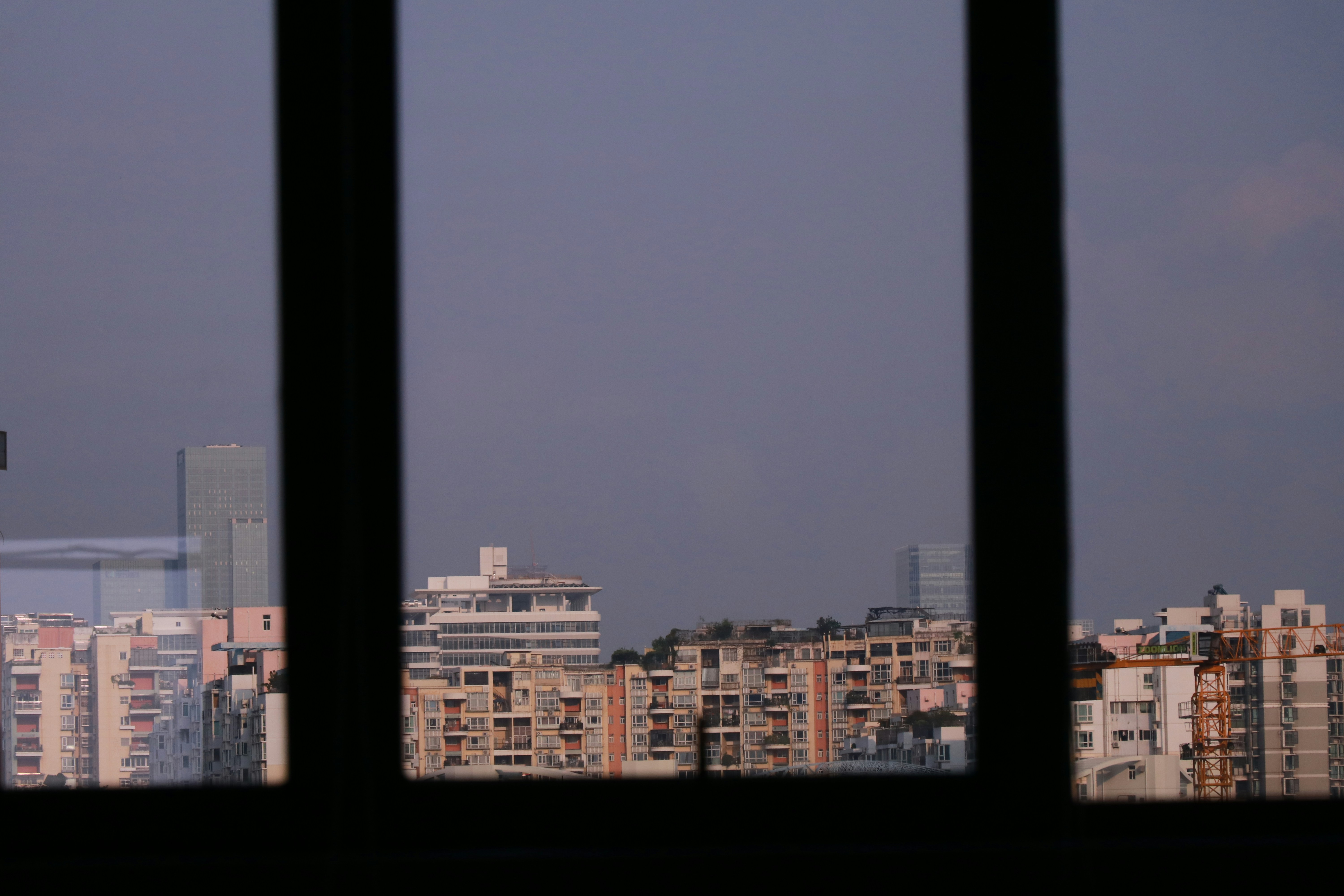 A view of a city from a window photo – Free Shenzhen Image on Unsplash