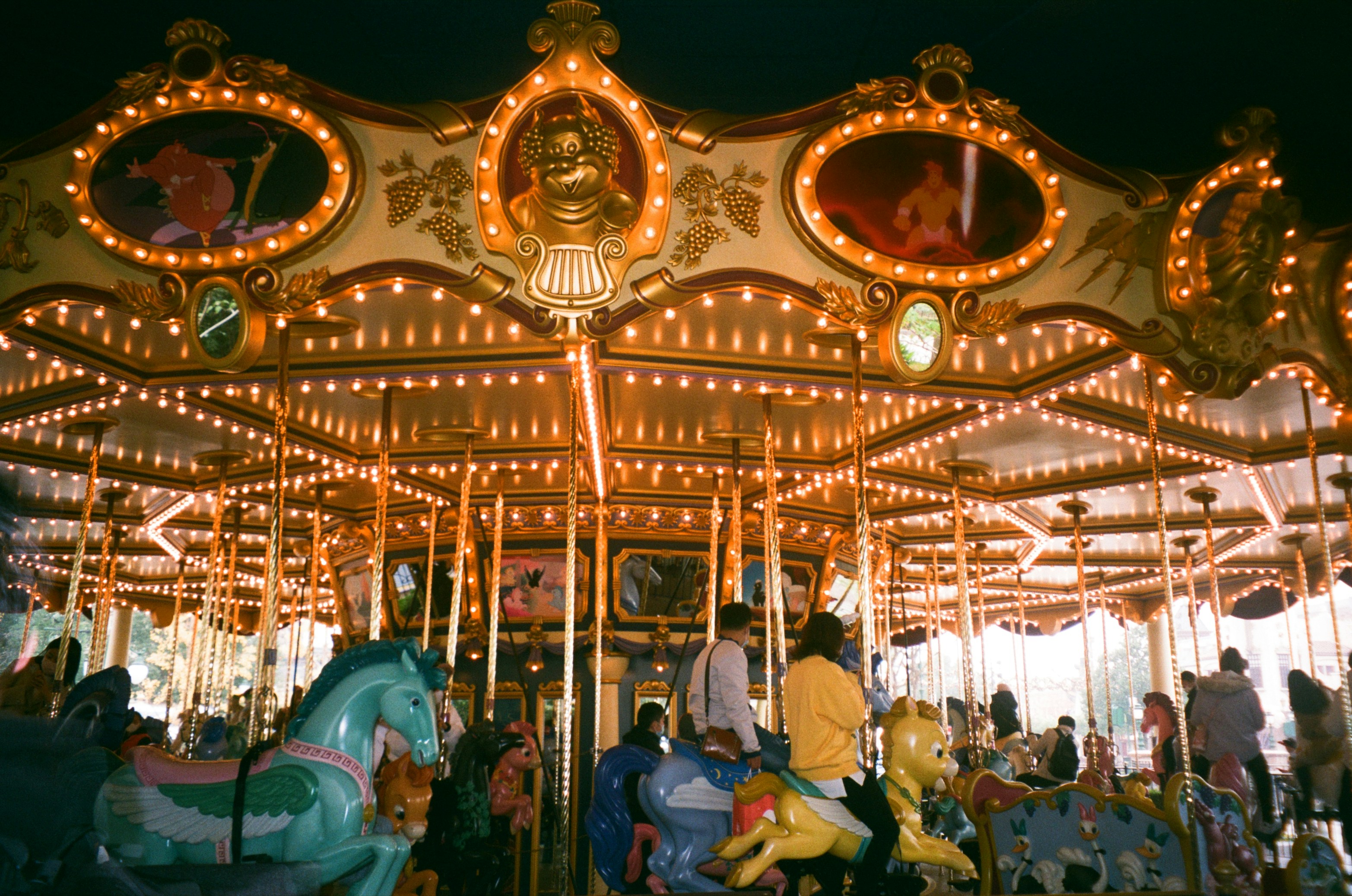 A carousel with people and animals photo – Free Shanghai Image on Unsplash
