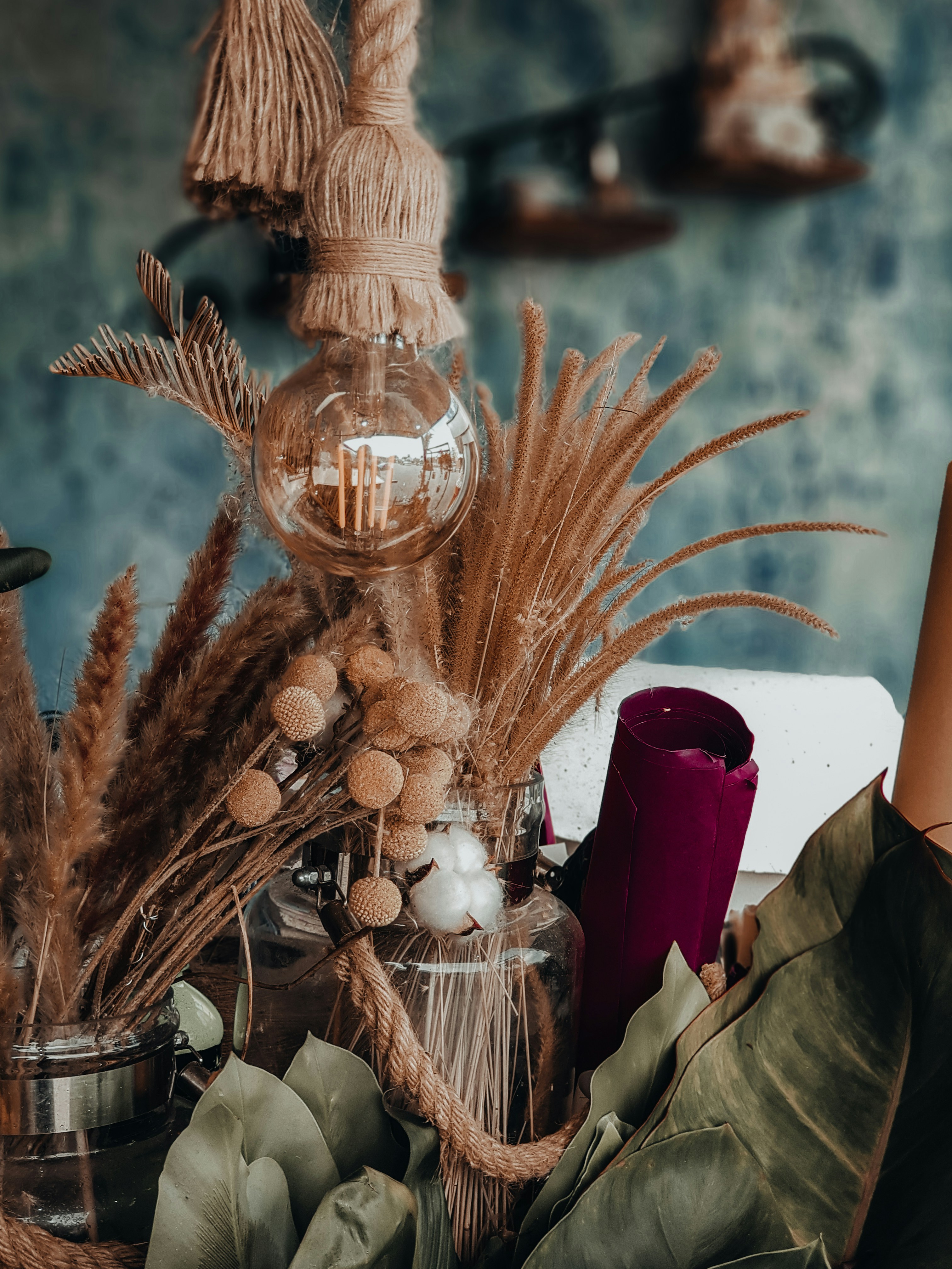 Glow in Glass: A Dried-Botanical Still Life with a Central Bulb