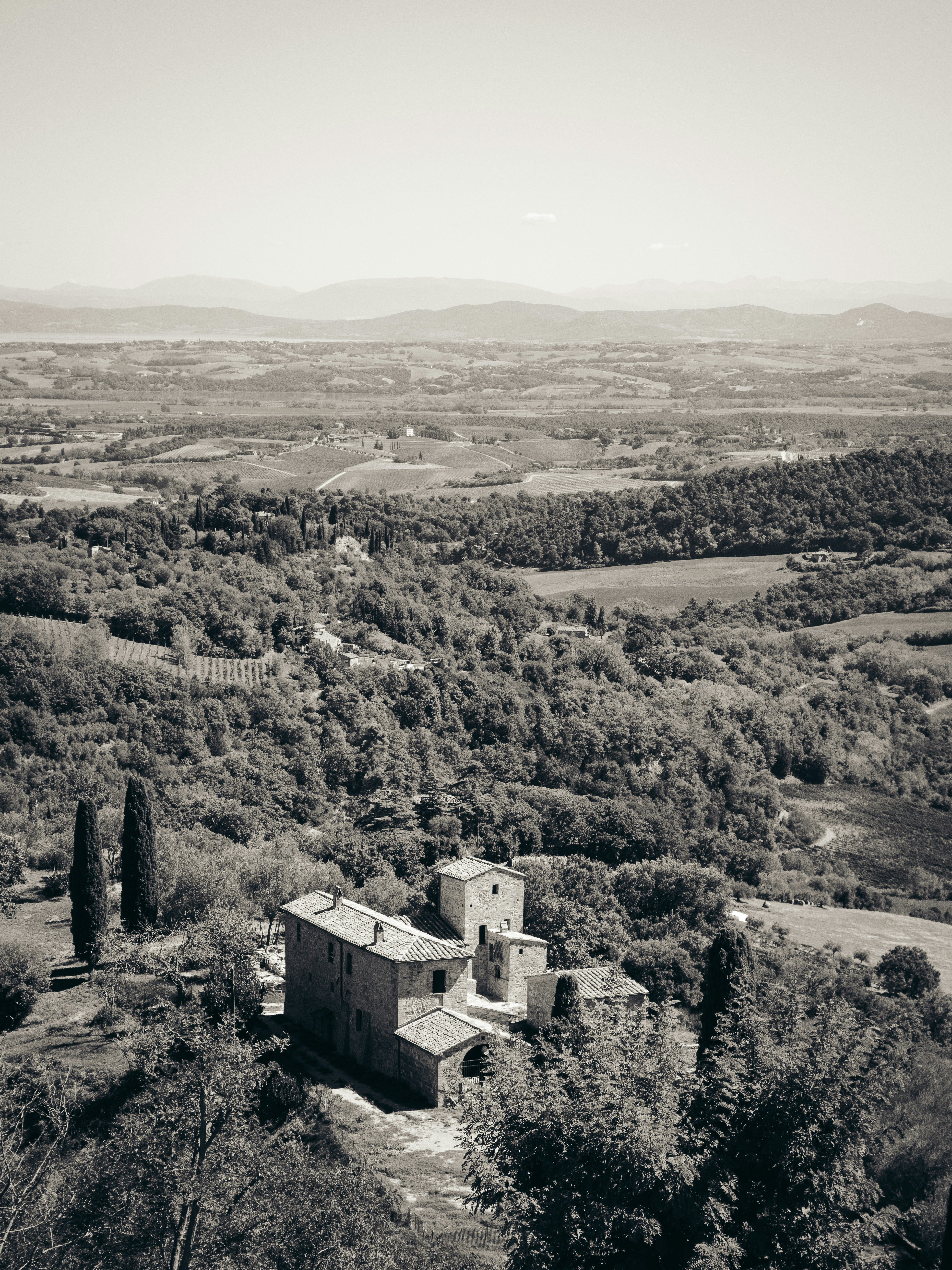 Sepia Tuscan Villa Among Rolling Hills and Cypress