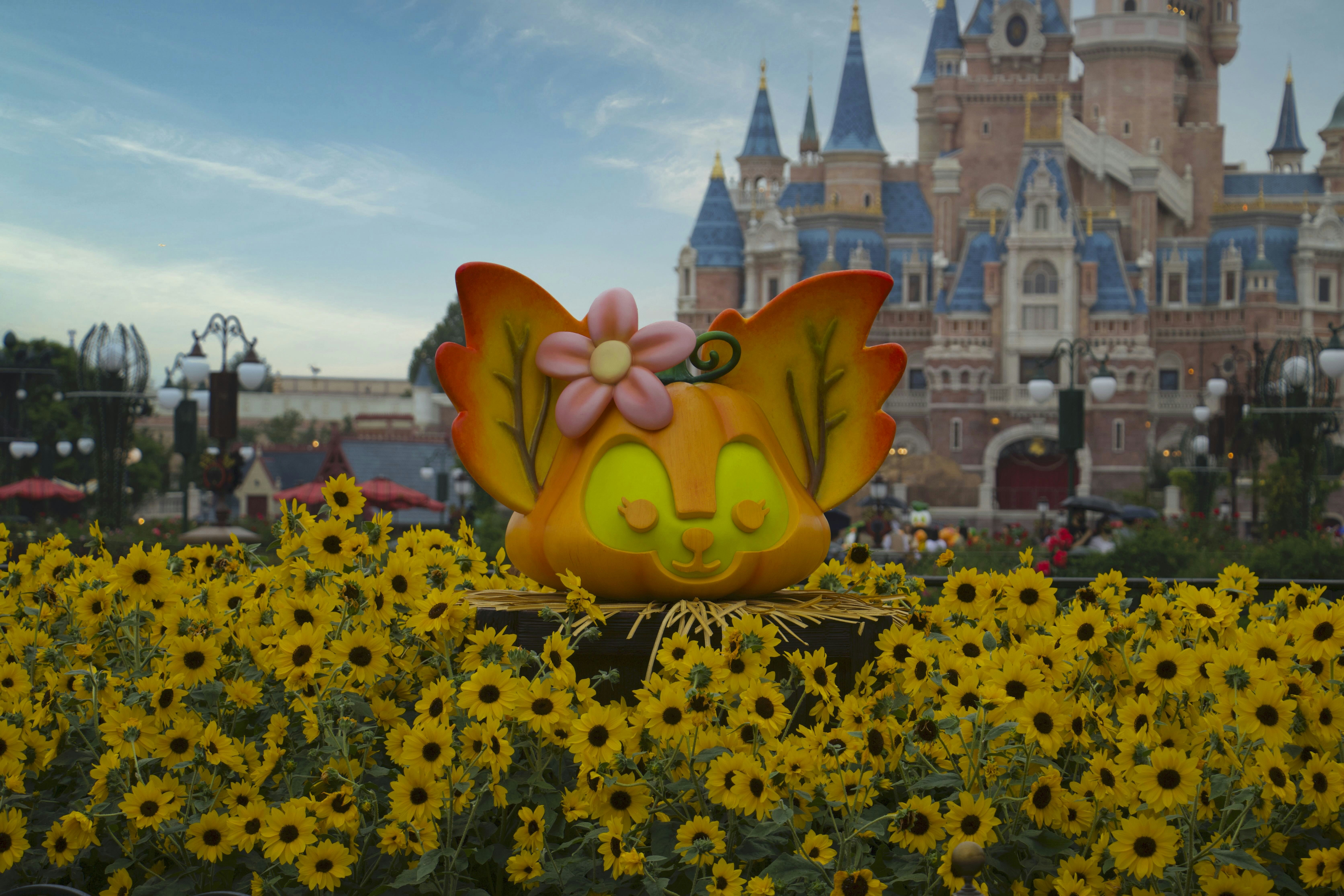 Sunlit Sunflower Field Meets a Smiling Castle Mascot