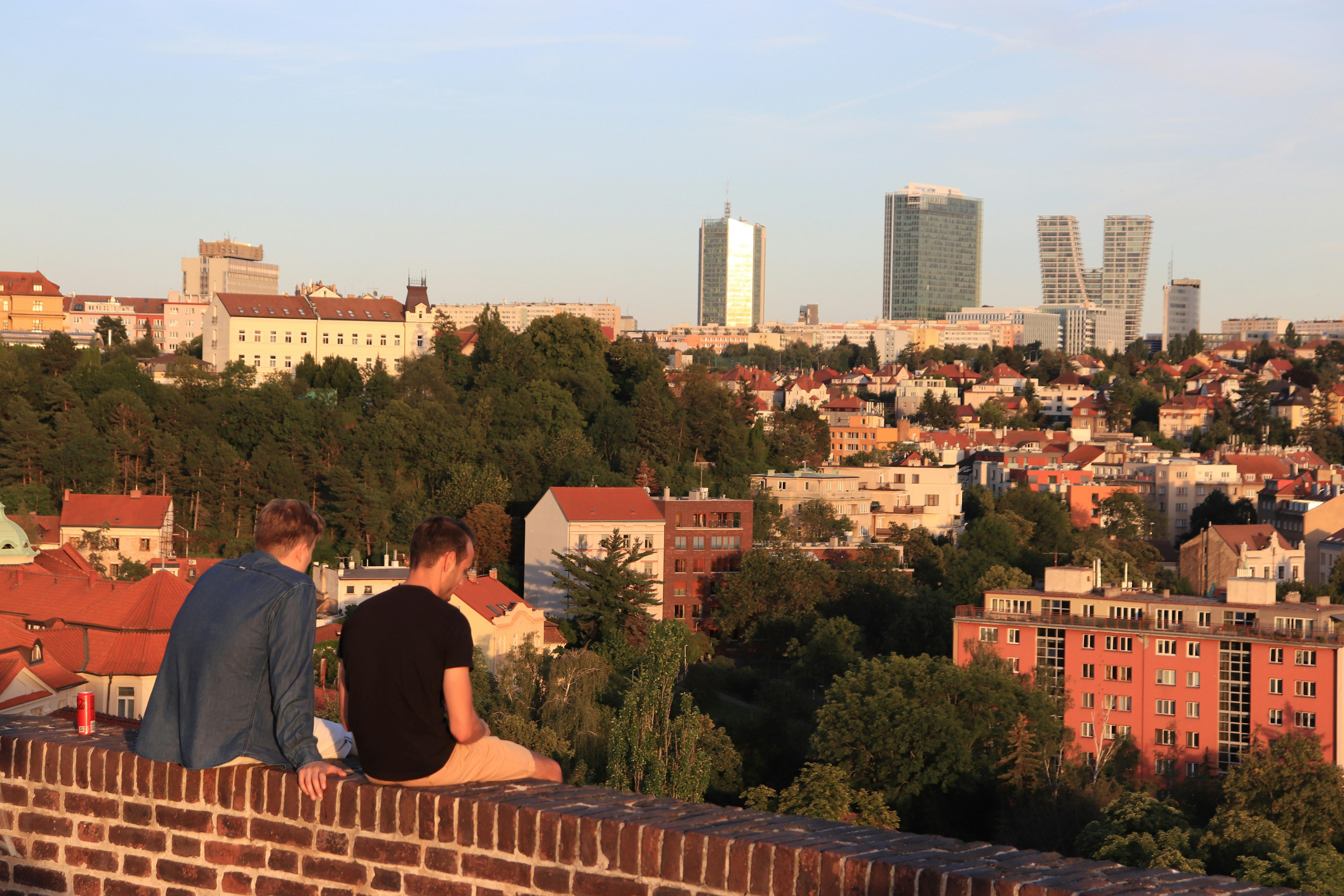Two men sitting on a roof photo – Free Czechia Image on Unsplash