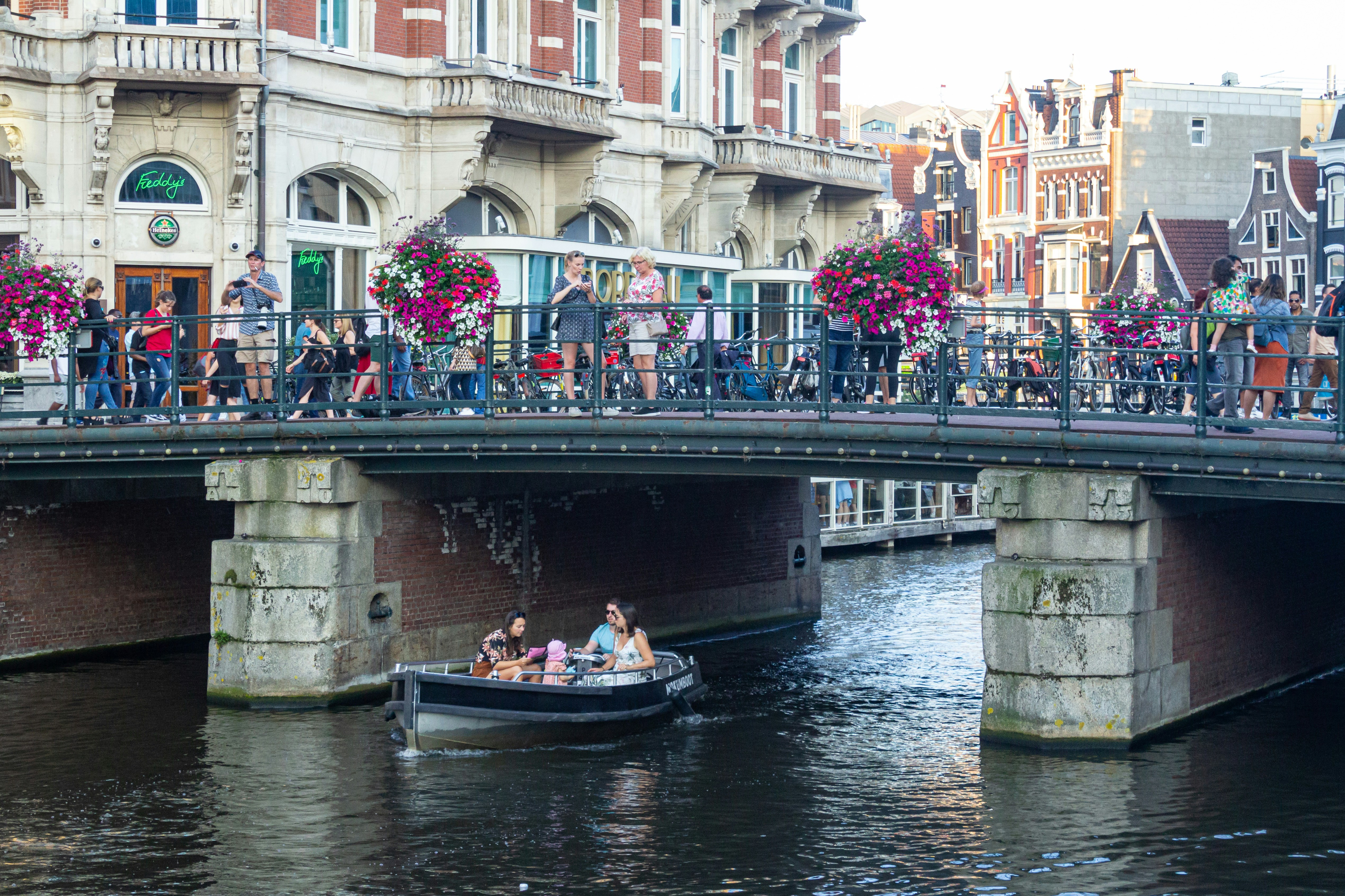 Florid Flowers and a Busy Canal Bridge