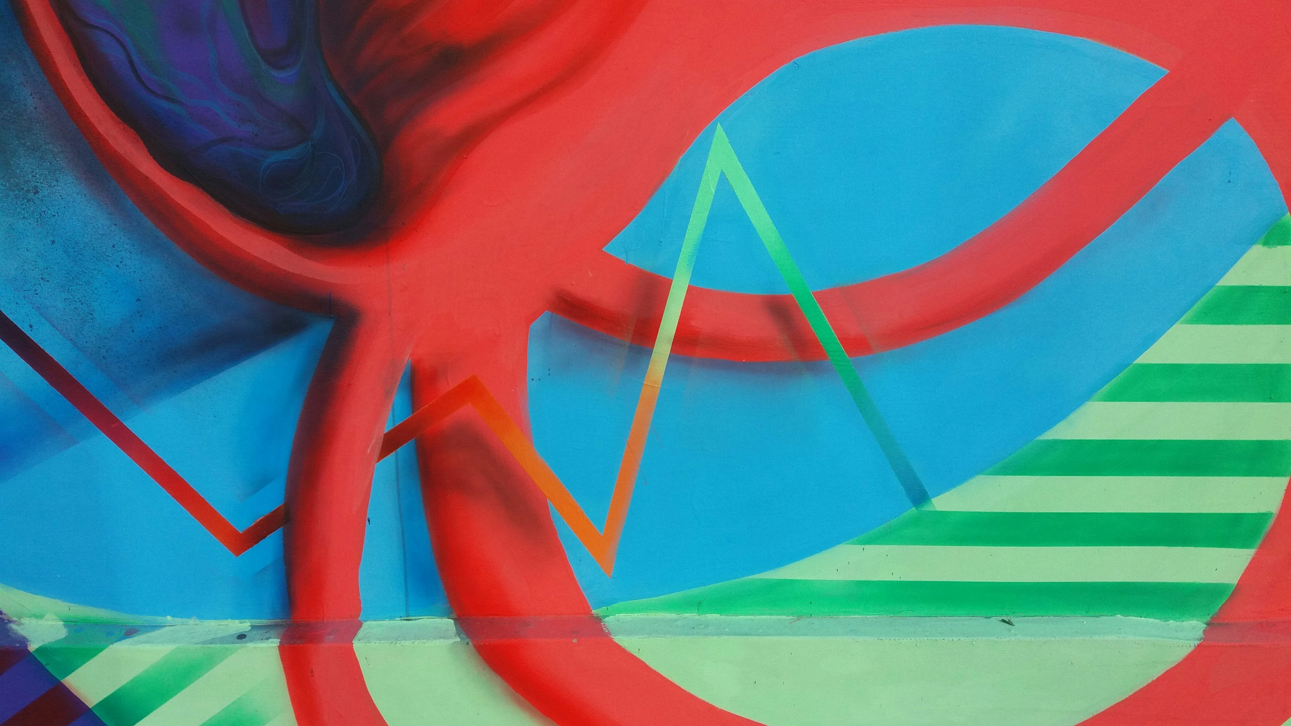 A red and green logo photo – Free Modern art Image on Unsplash