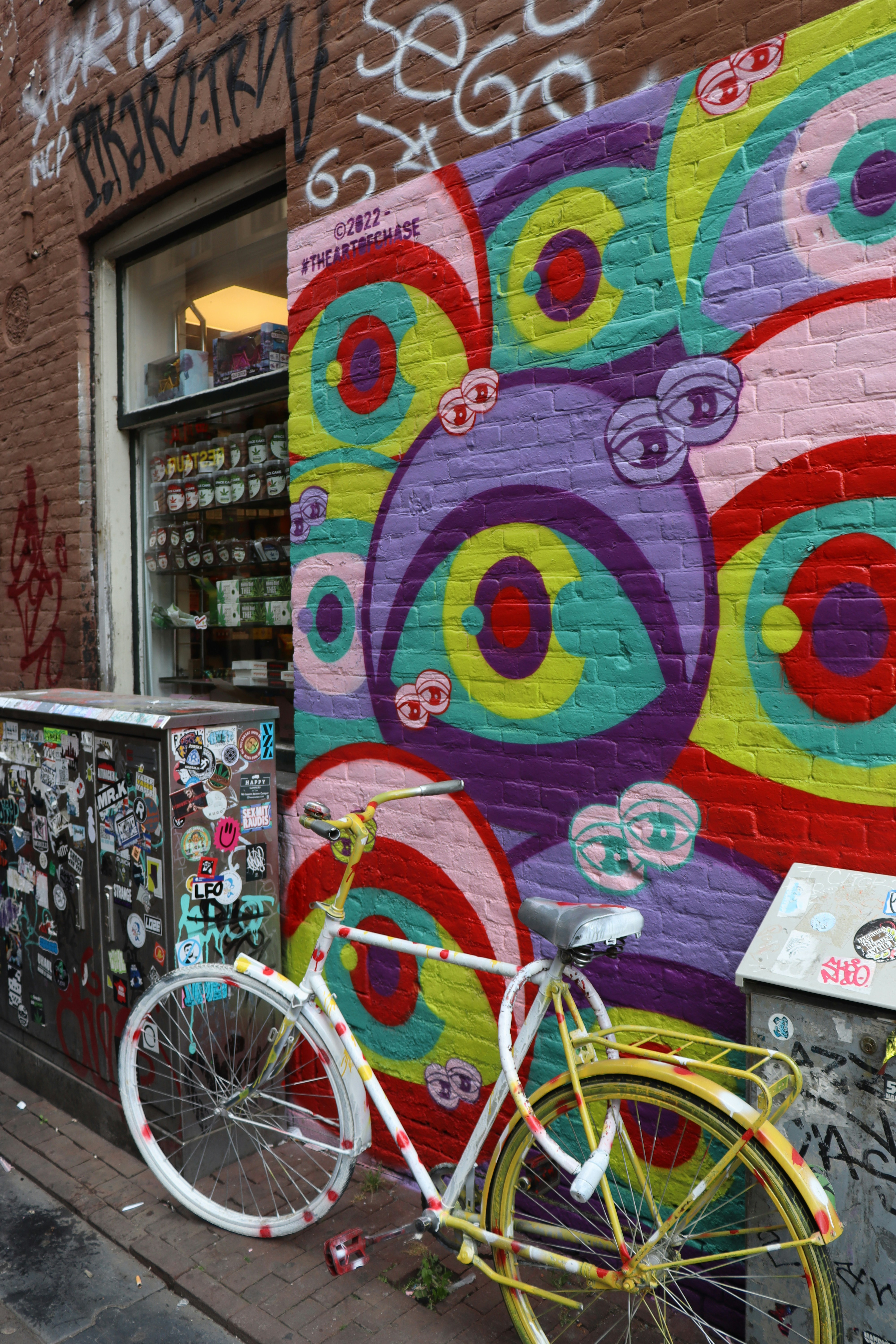 A Neon Slice of Street: Bicycle Against a Kaleidoscopic Wall