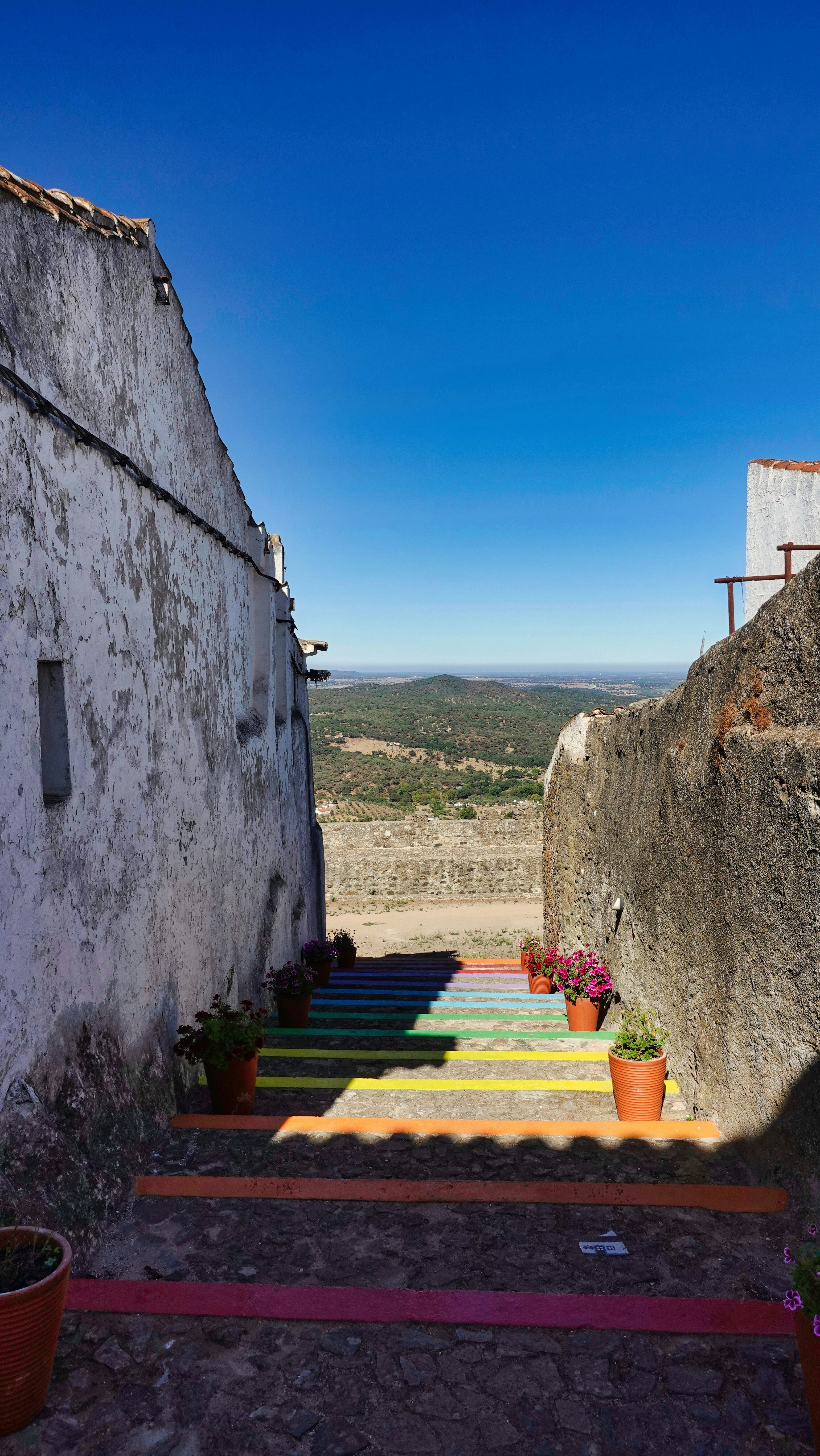 A stone staircase between two stone buildings photo – Free Evoramonte ...