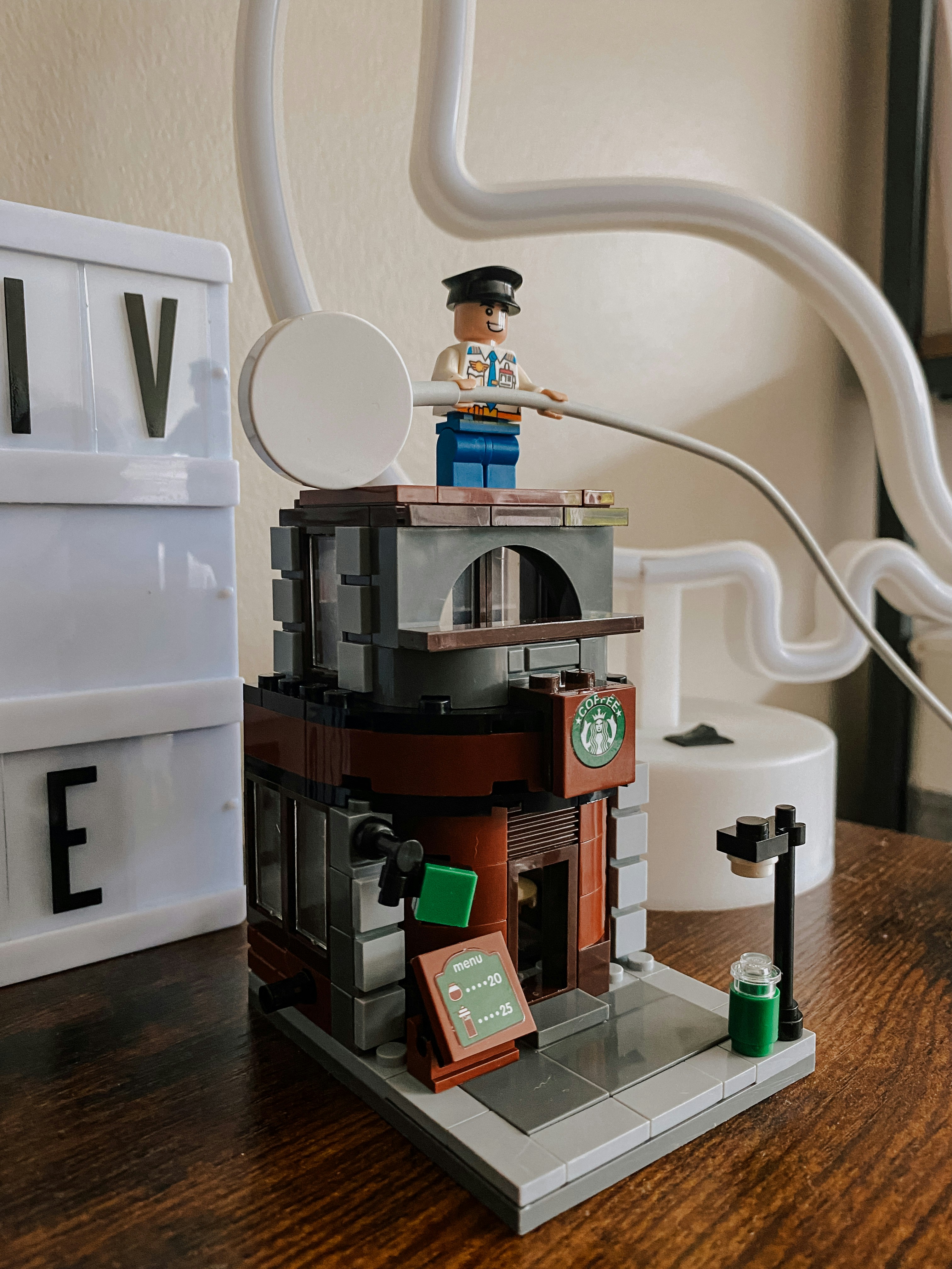 A toy figurine on a shelf photo – Free Lego Image on Unsplash