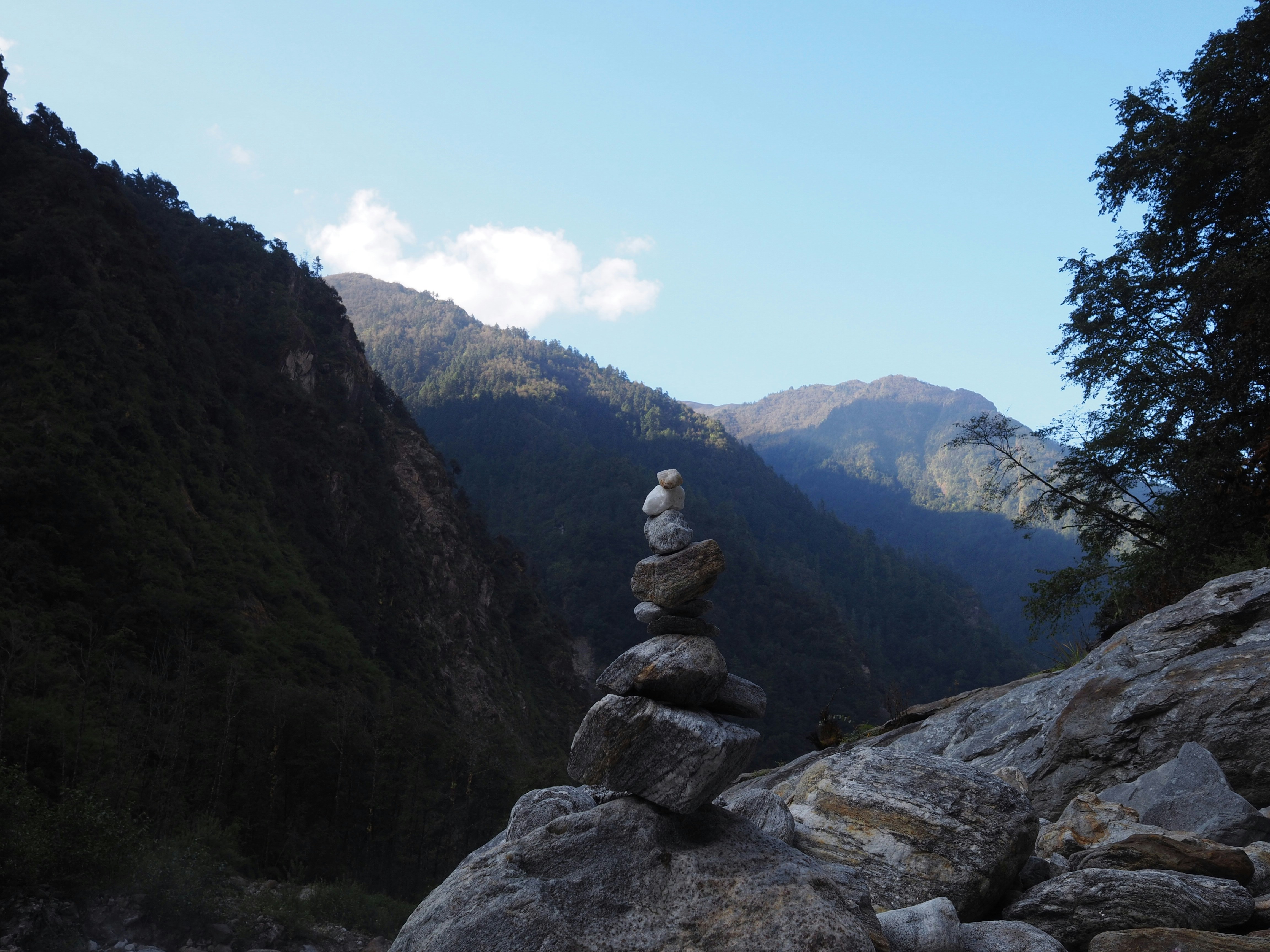 Cairn at the Mountain Pass: A Quiet Stack Against Canyon Light
