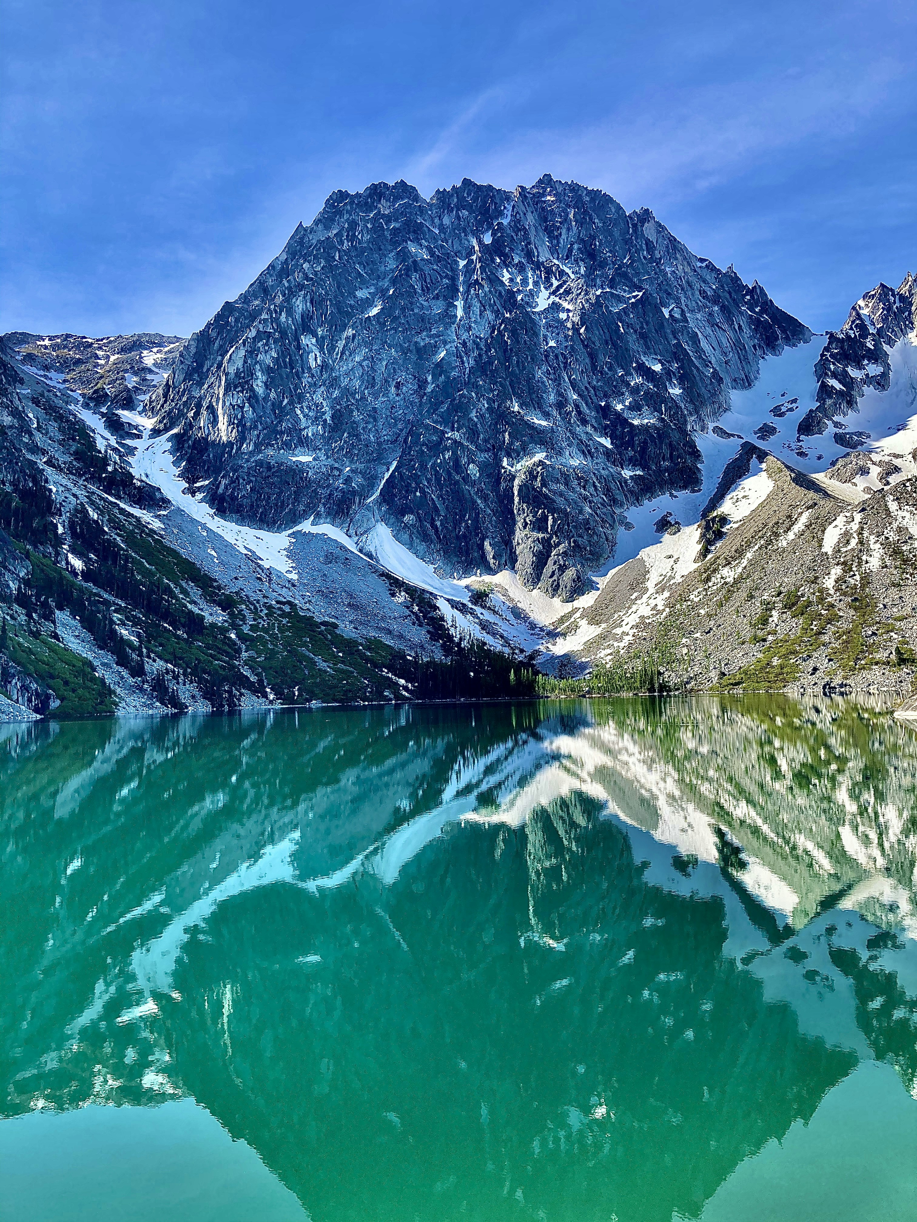 Reflections of Majesty: The Emerald Lake's Mountain Guardians