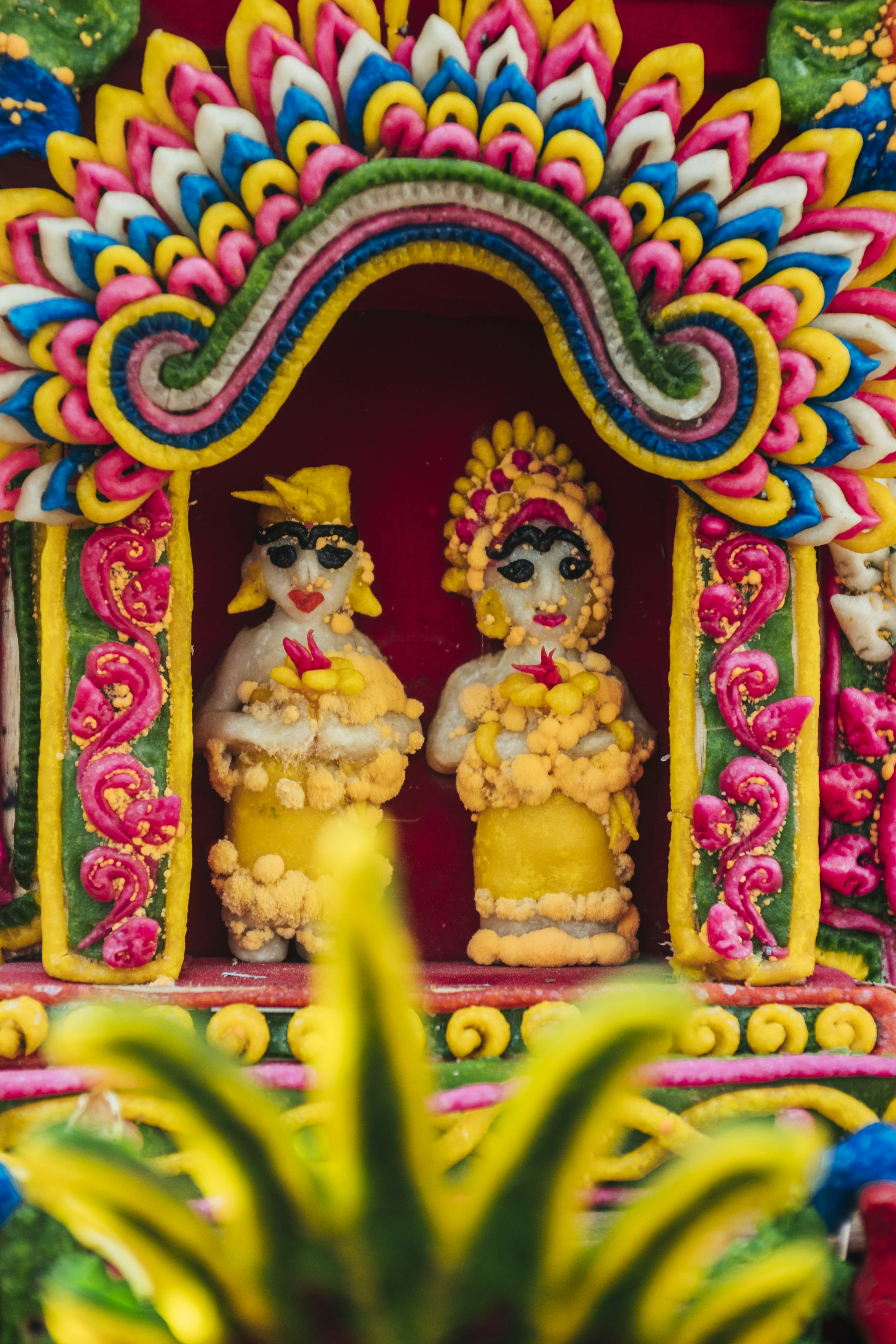 a group of dolls in a rainbow