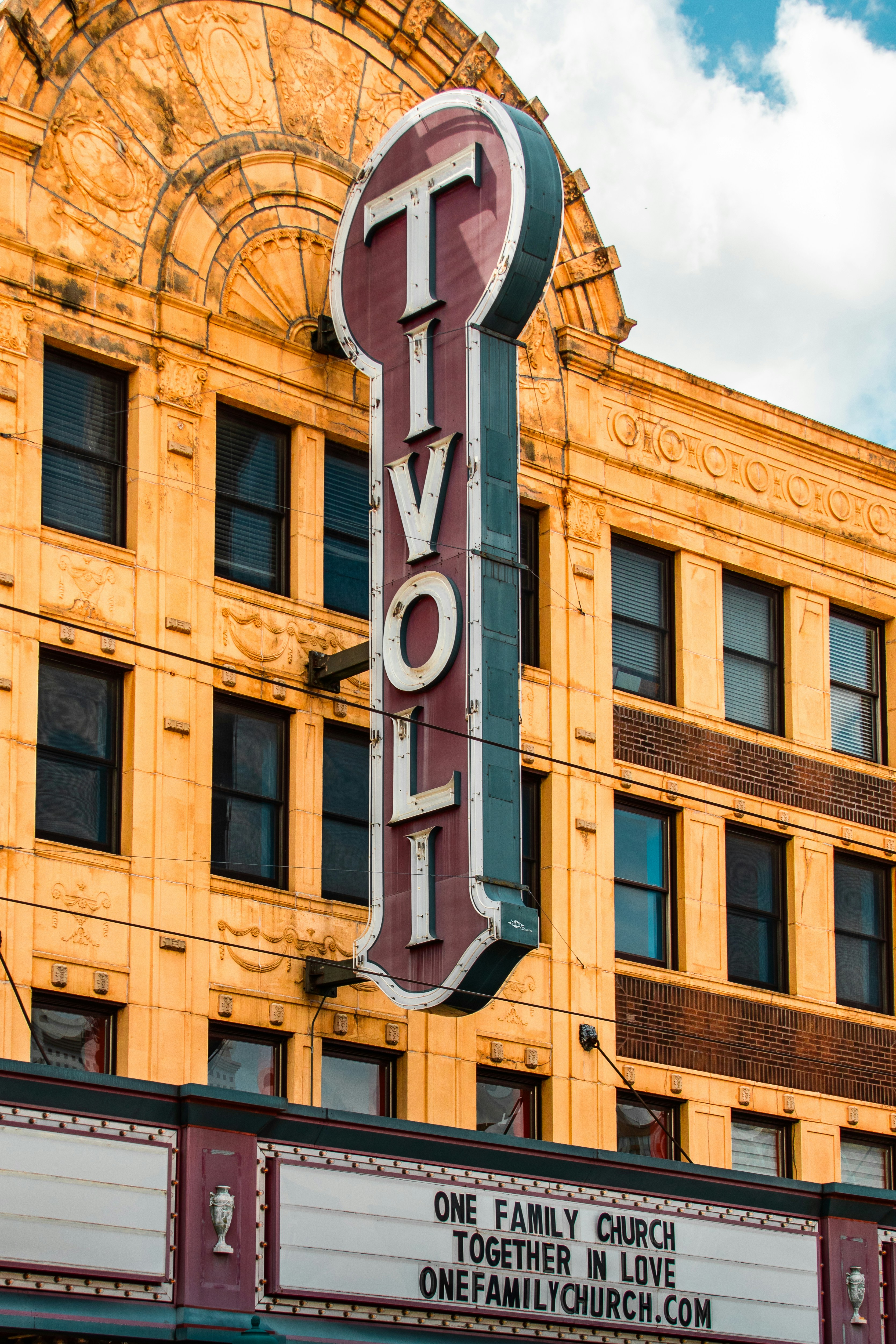 A large sign on the side of a building photo – Free Delmar loop Image ...