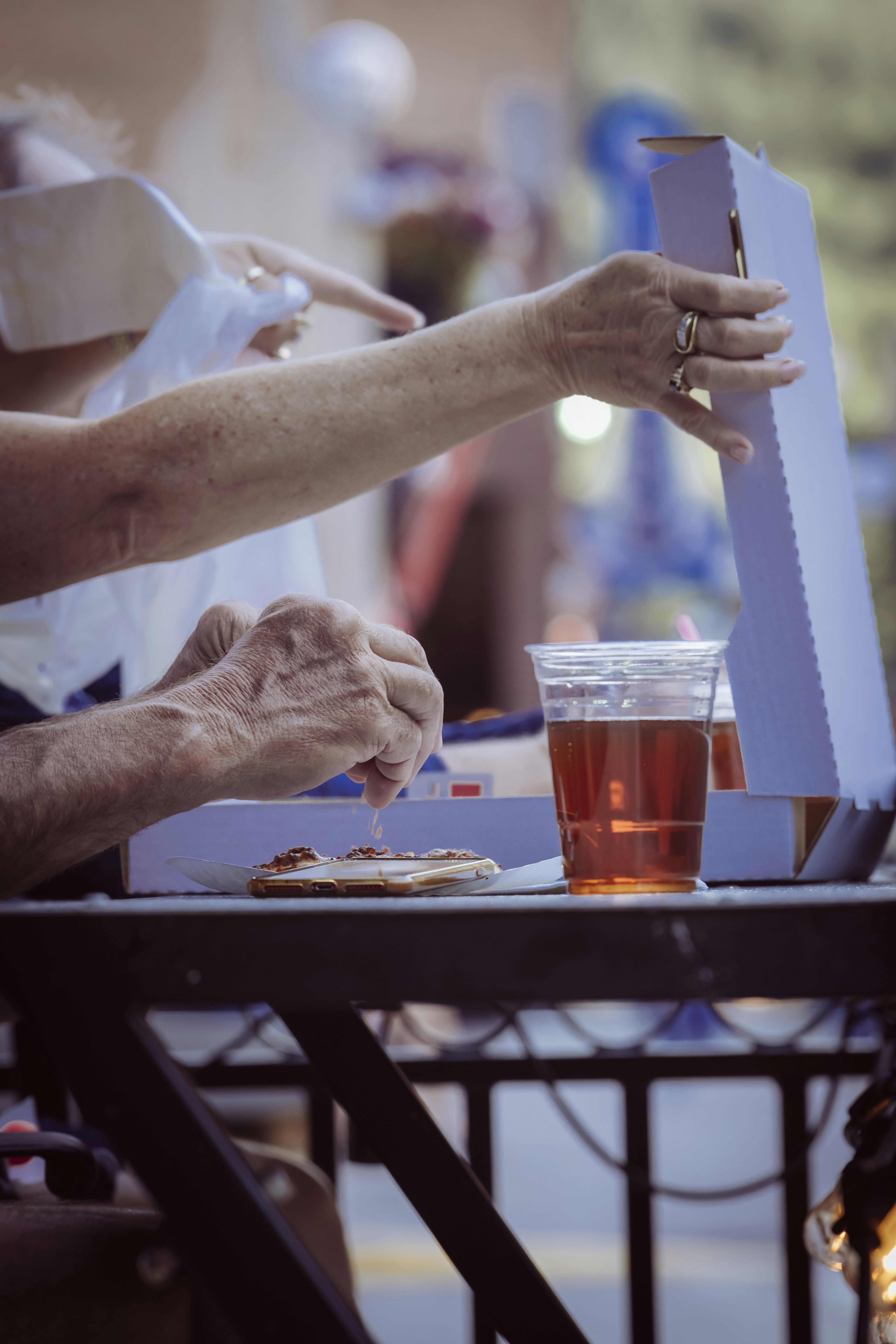 Hands at the Stand: Crafting a Bite Under Warm Afternoon Light