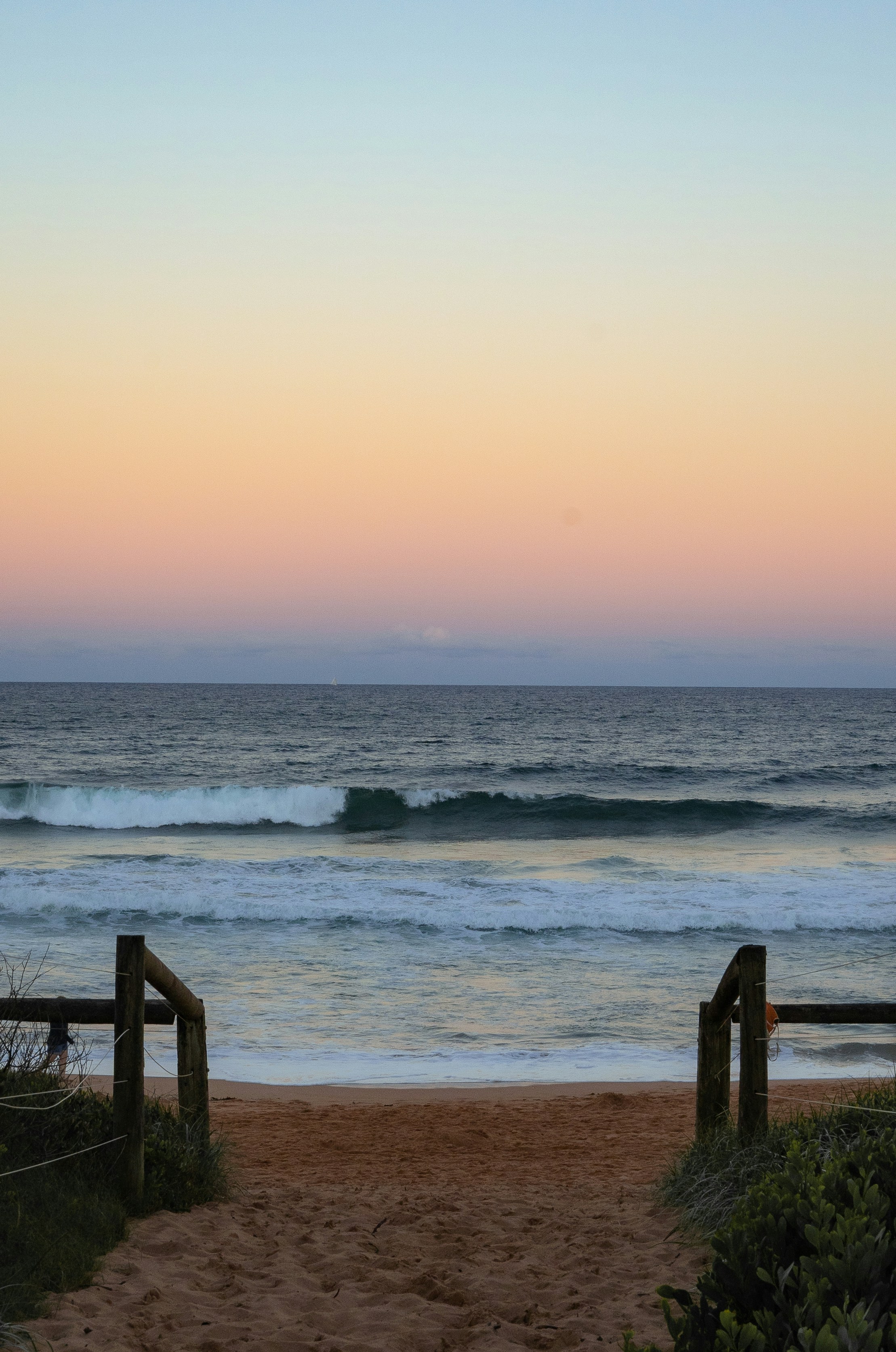 A beach with waves crashing photo – Free Water Image on Unsplash