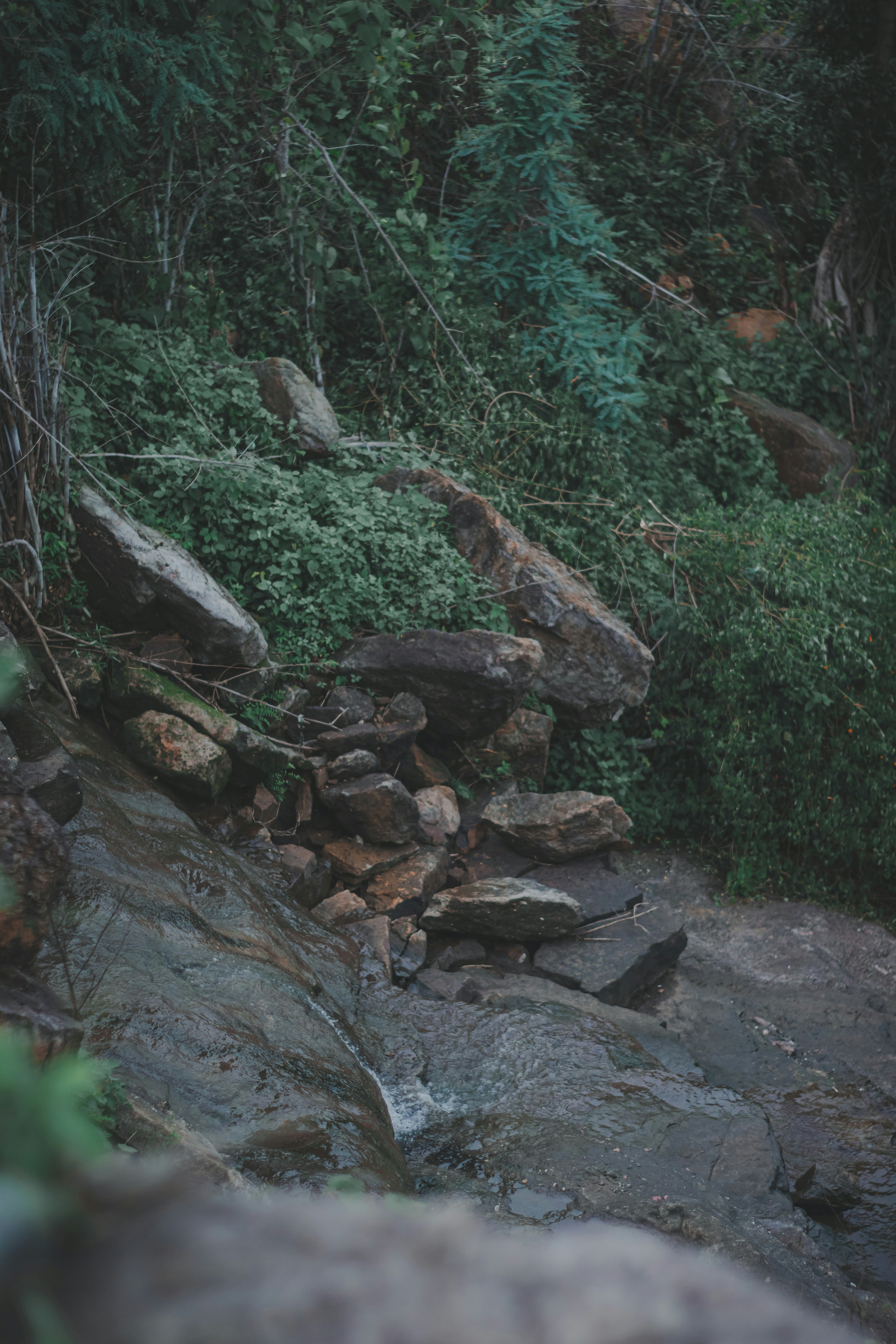 water slowly falling over the stones.