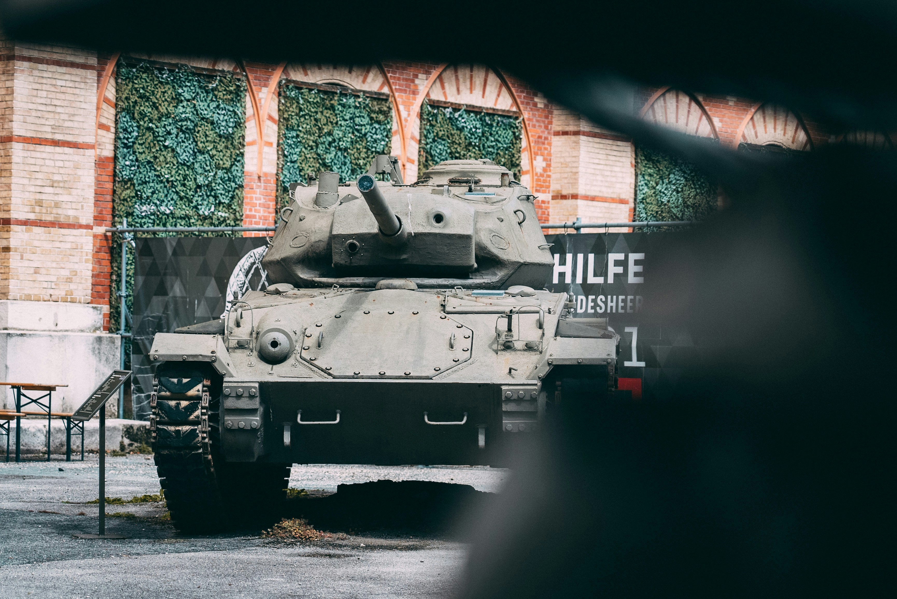 A tank parked in a garage photo – Free Tank Image on Unsplash