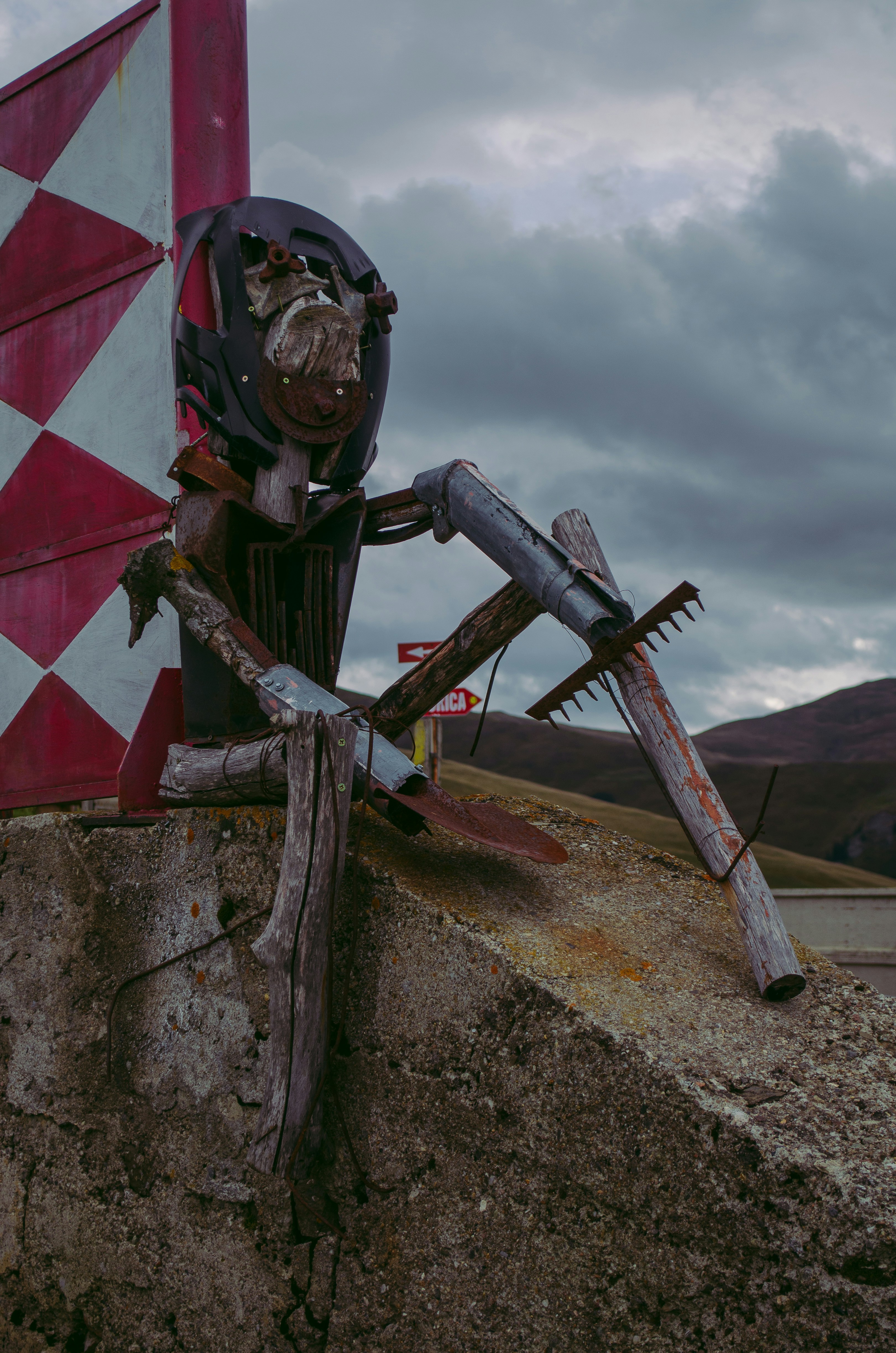 Rust and Red: A Silent Sentinel by the Scarp