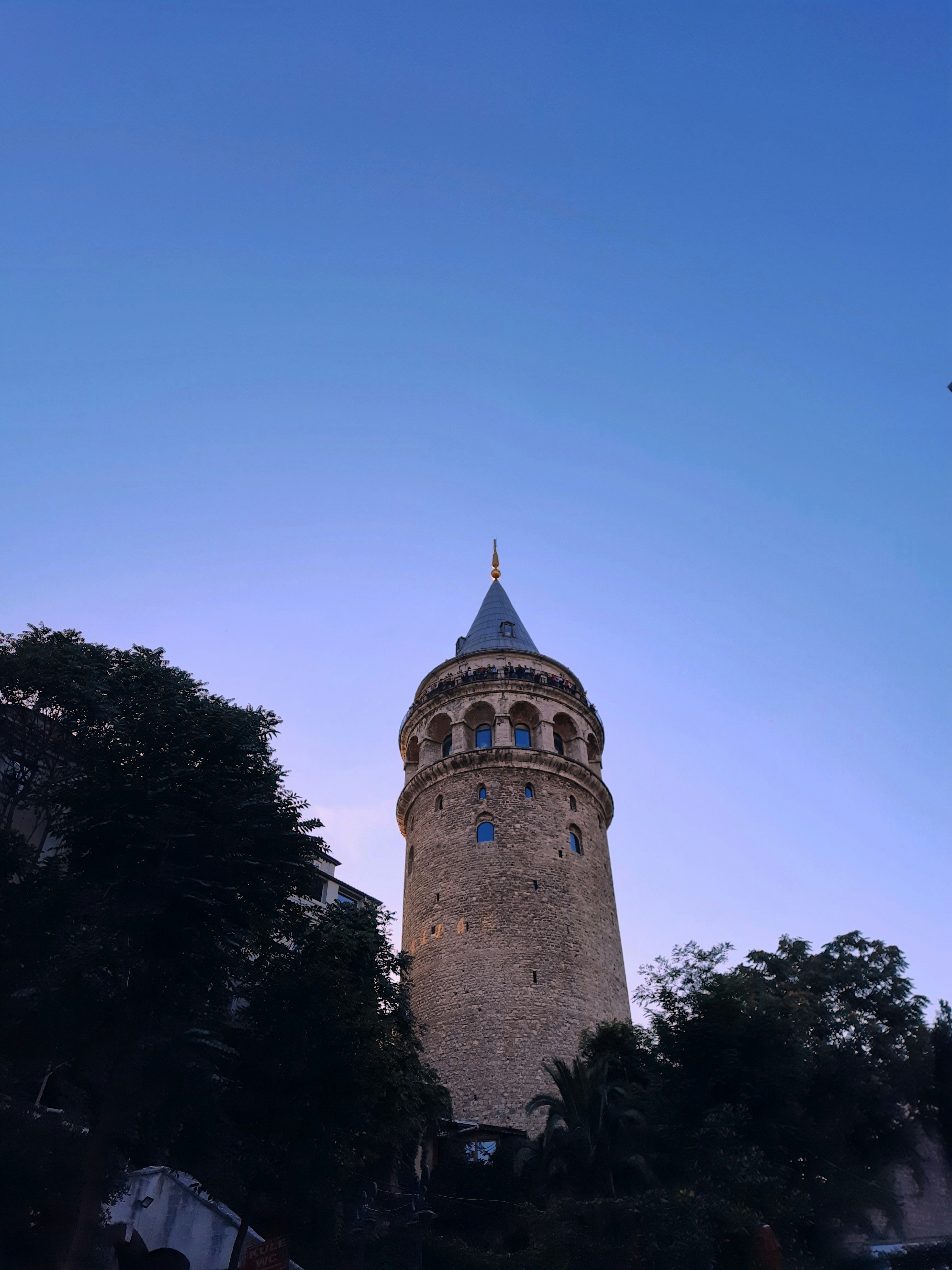 Evening Sentinel: A Stone Tower Reaching Toward a Velvet Sky