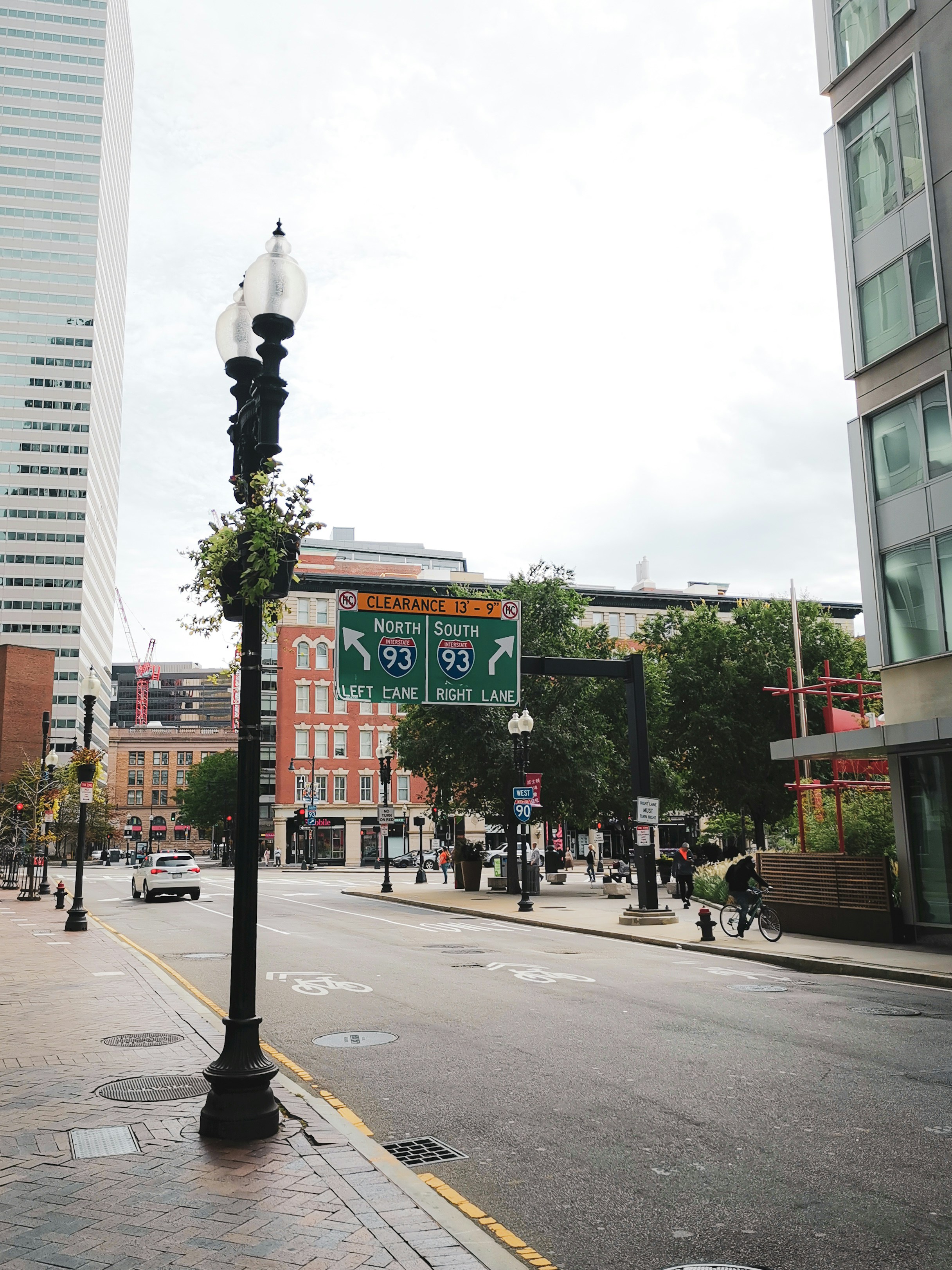 Green Guideposts at a Downtown Crossing