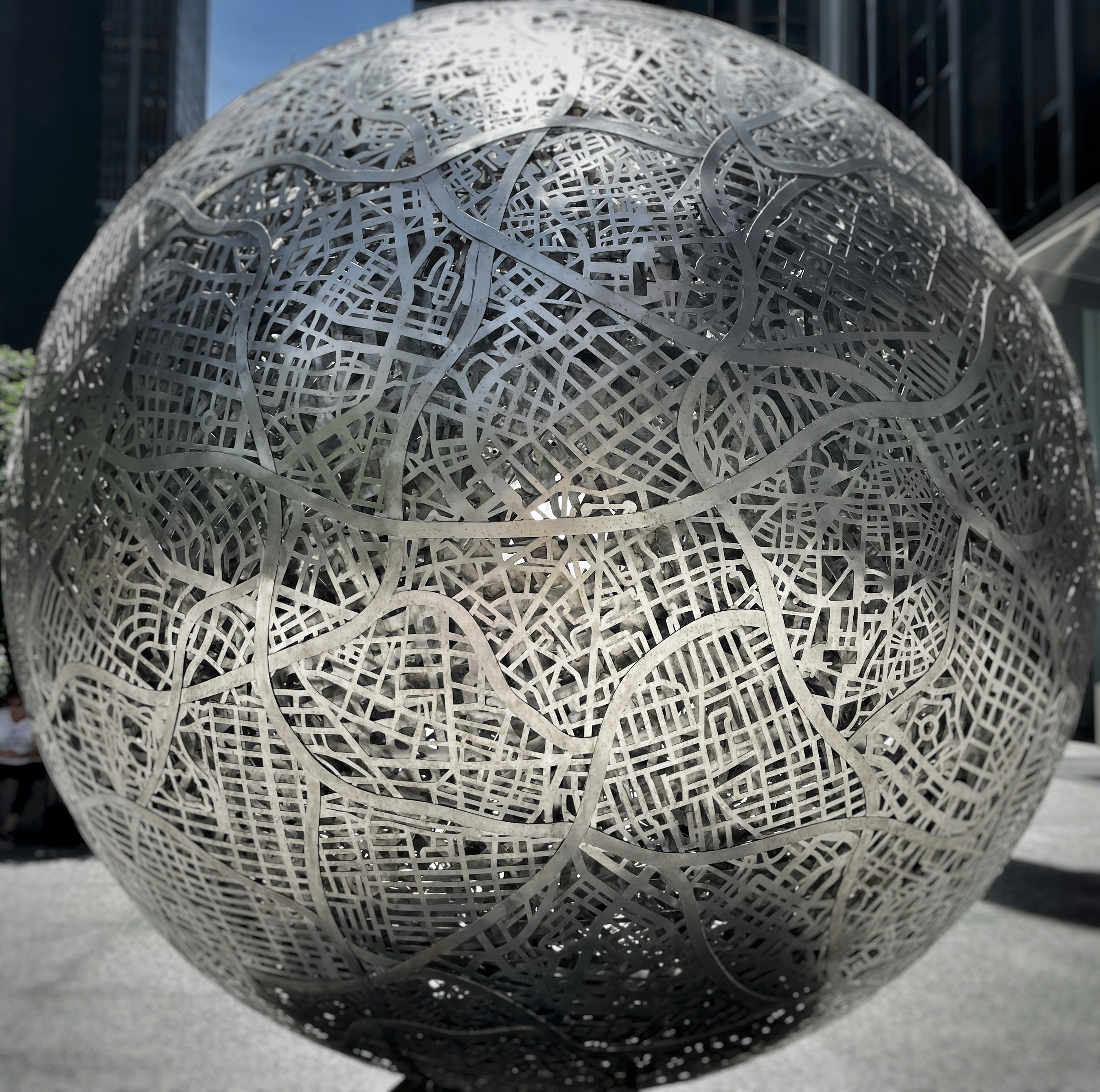 a large sphere with a hole in it