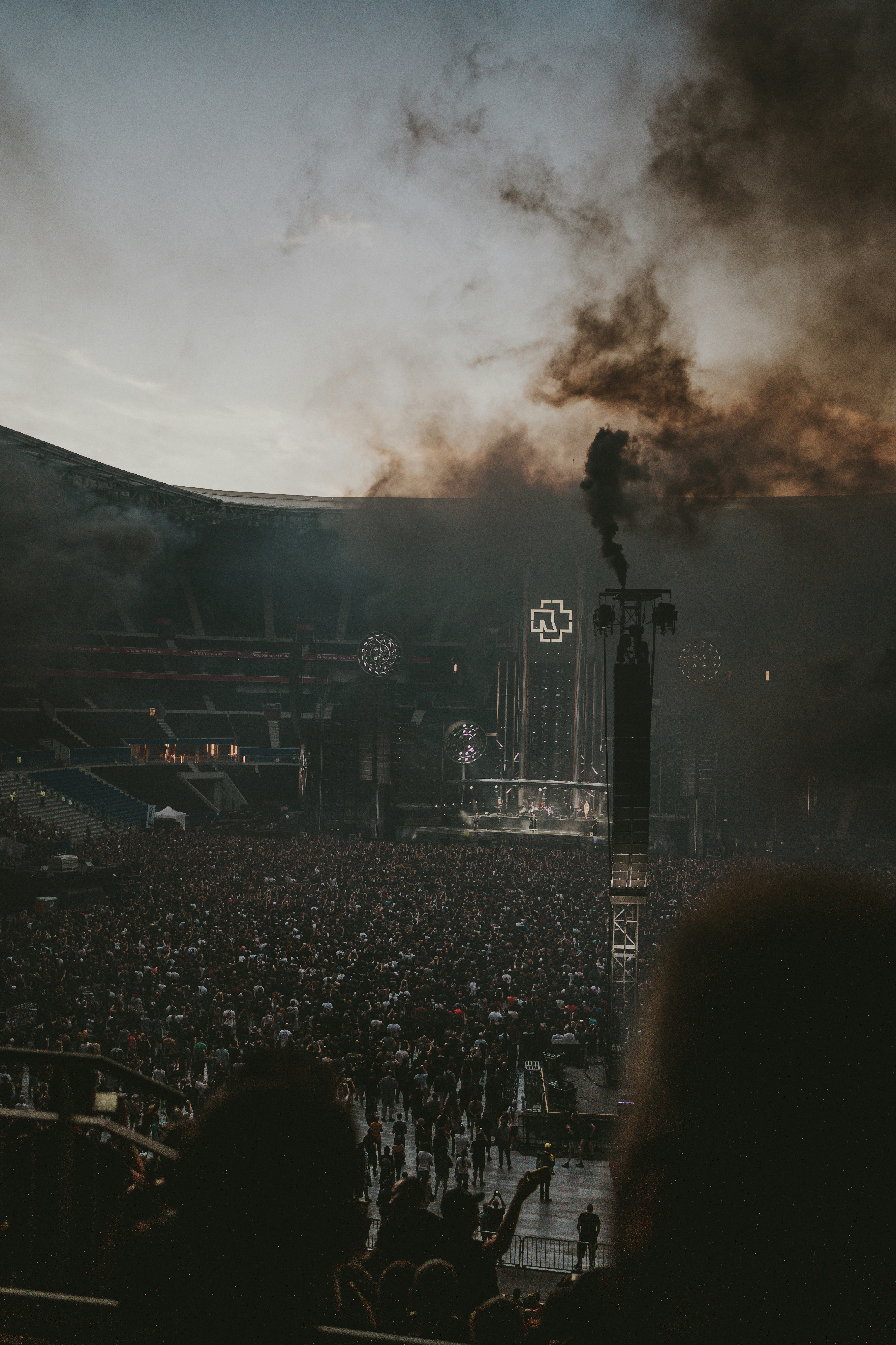 Smoked Symmetry: Night of Pyro and People in a Packed Stadium