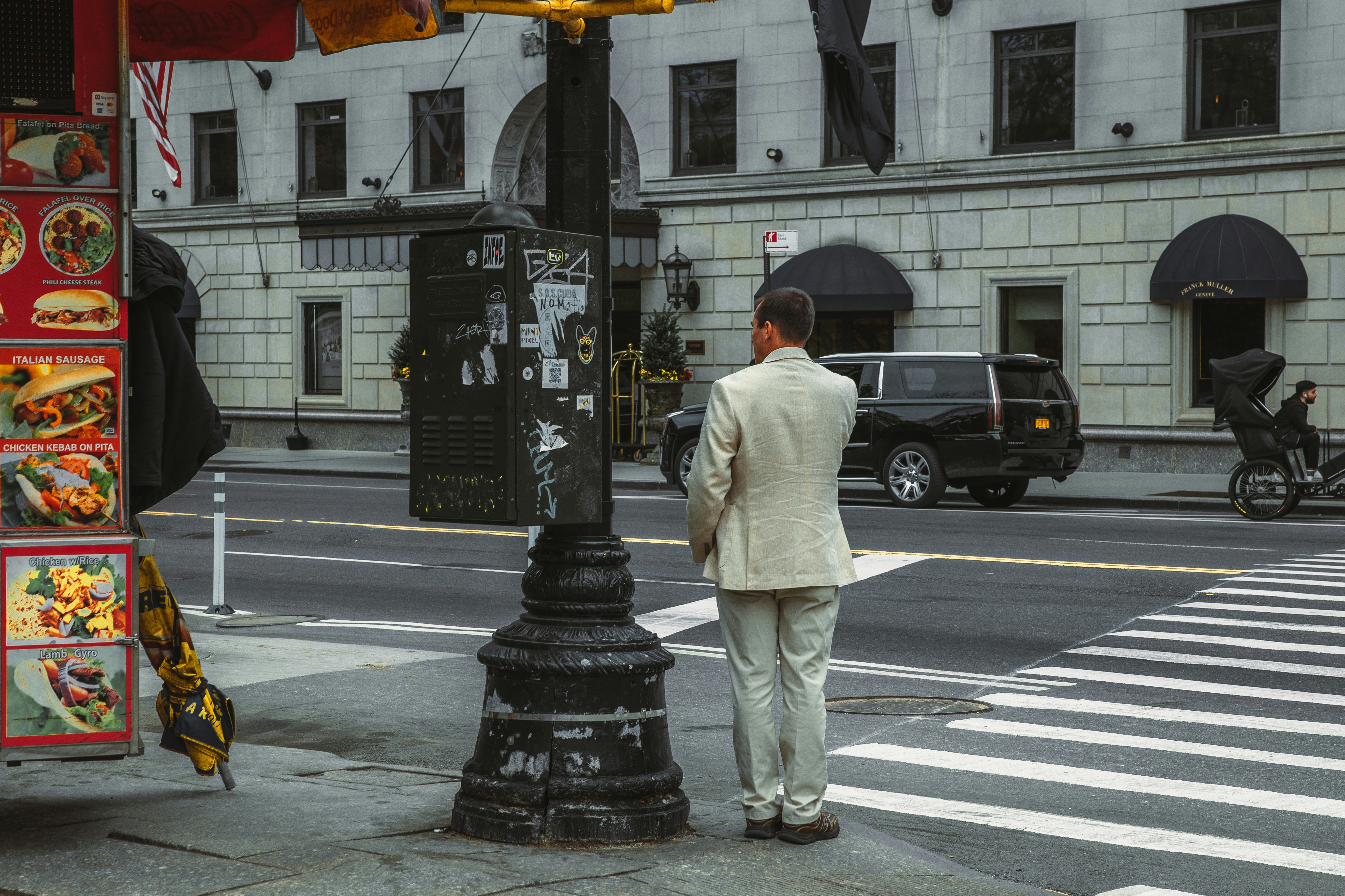 A person standing in the middle of a crosswalk photo – Free Business ...