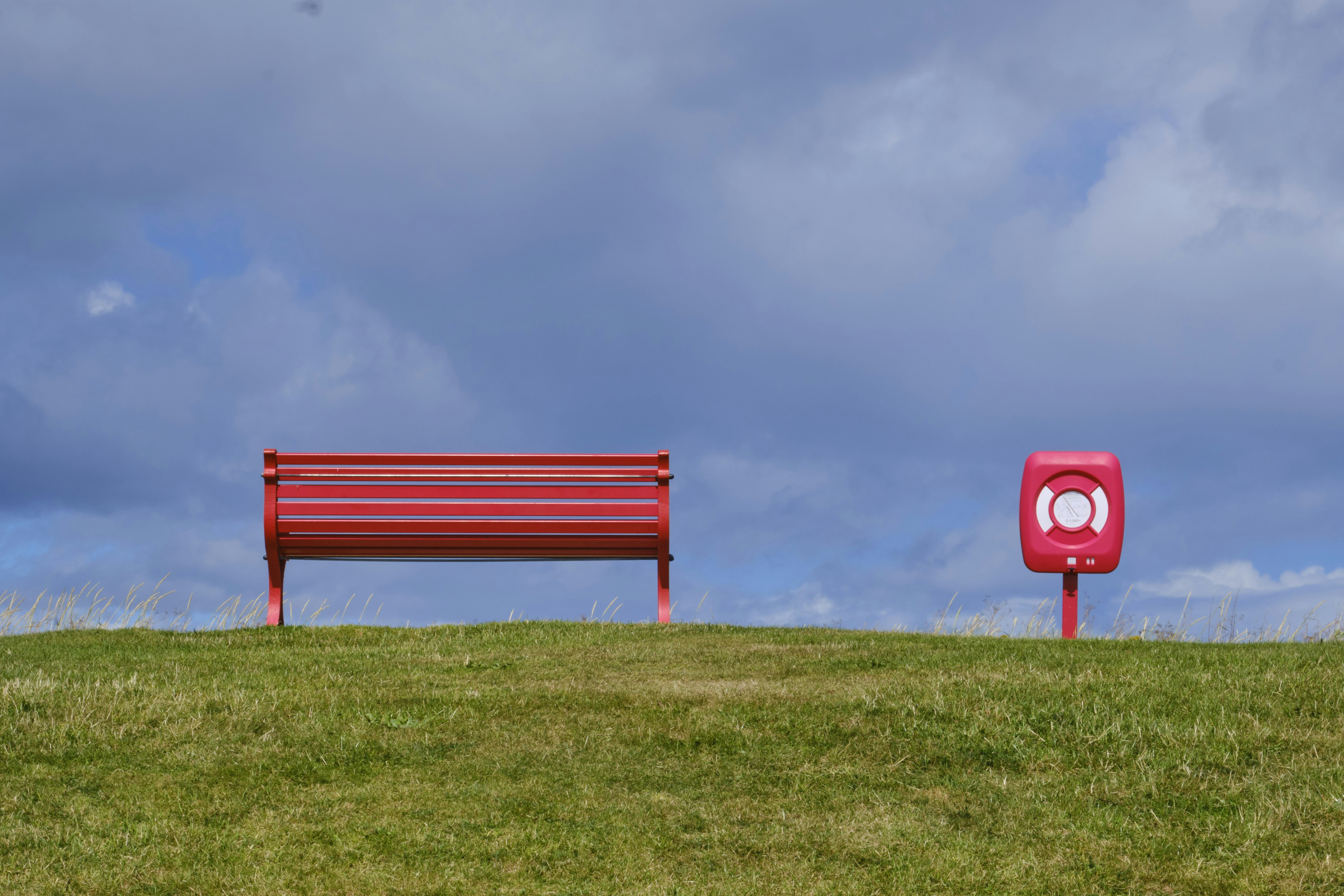A bench in a field photo – Free Nairn beach Image on Unsplash