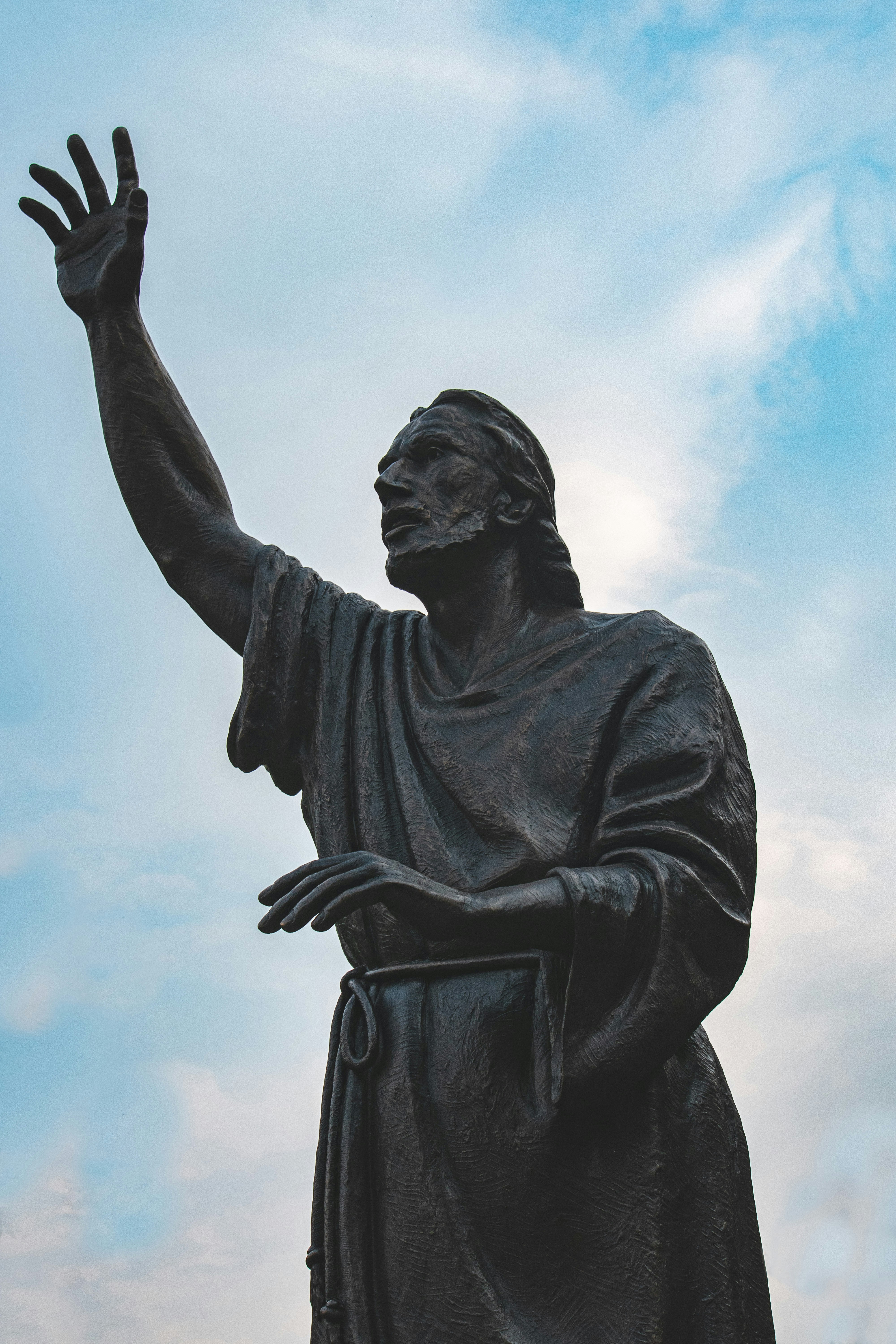 A statue of a person with the hands up photo – Free Statue Image on ...