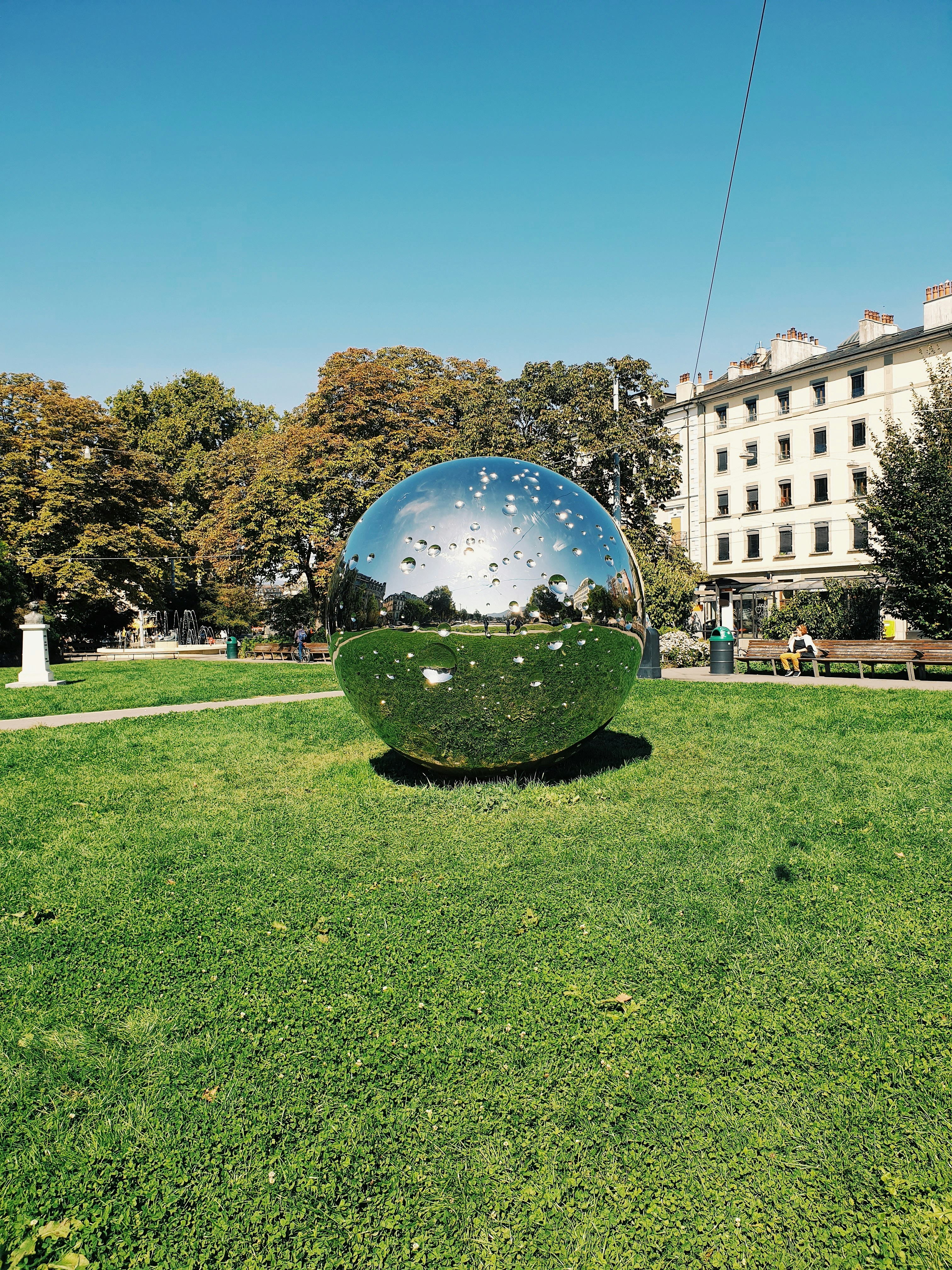 A large reflective sphere in a park photo – Free Switzerland Image on ...
