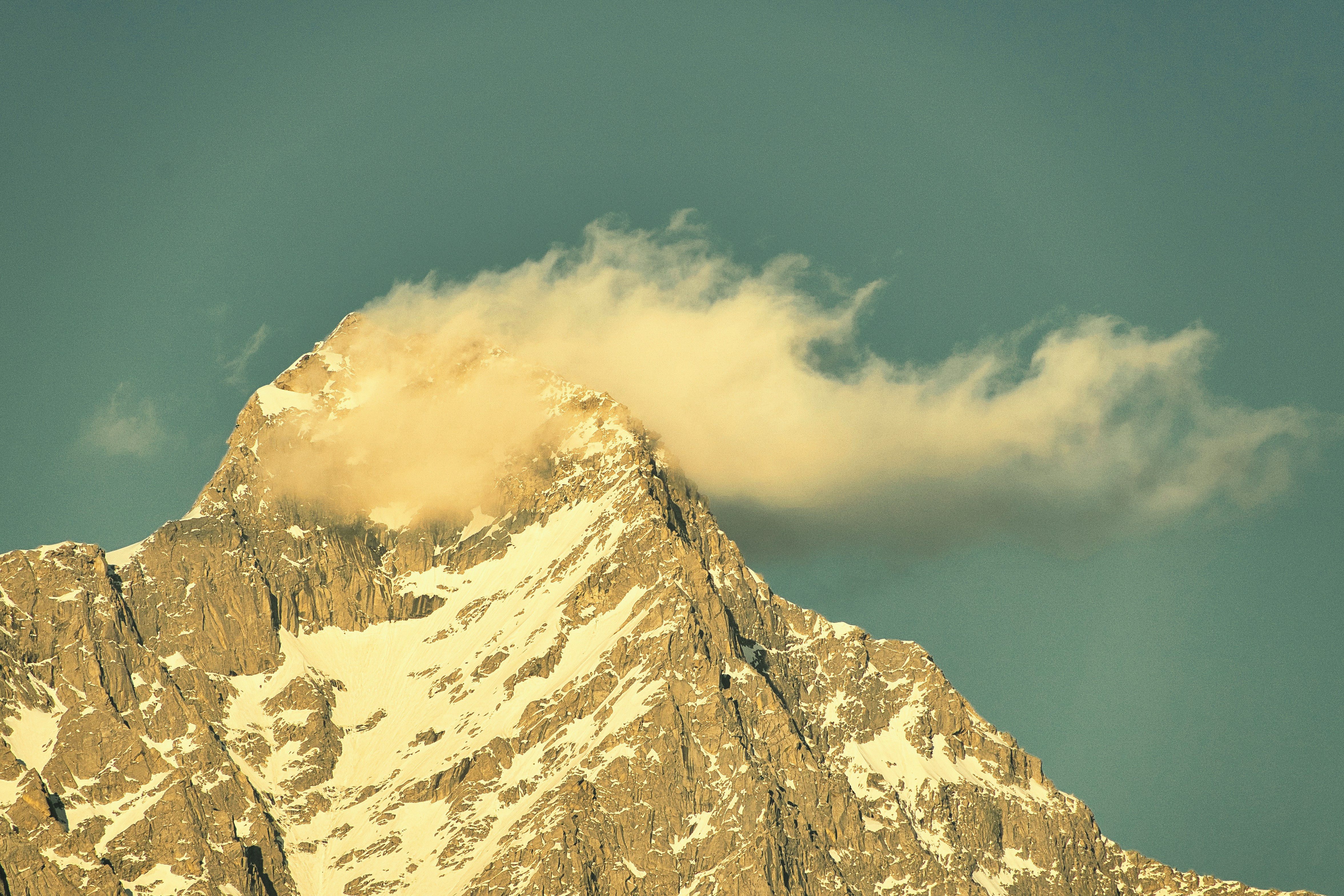 Snow-Crowned Summit Elevates a Quiet Alpine Dawn