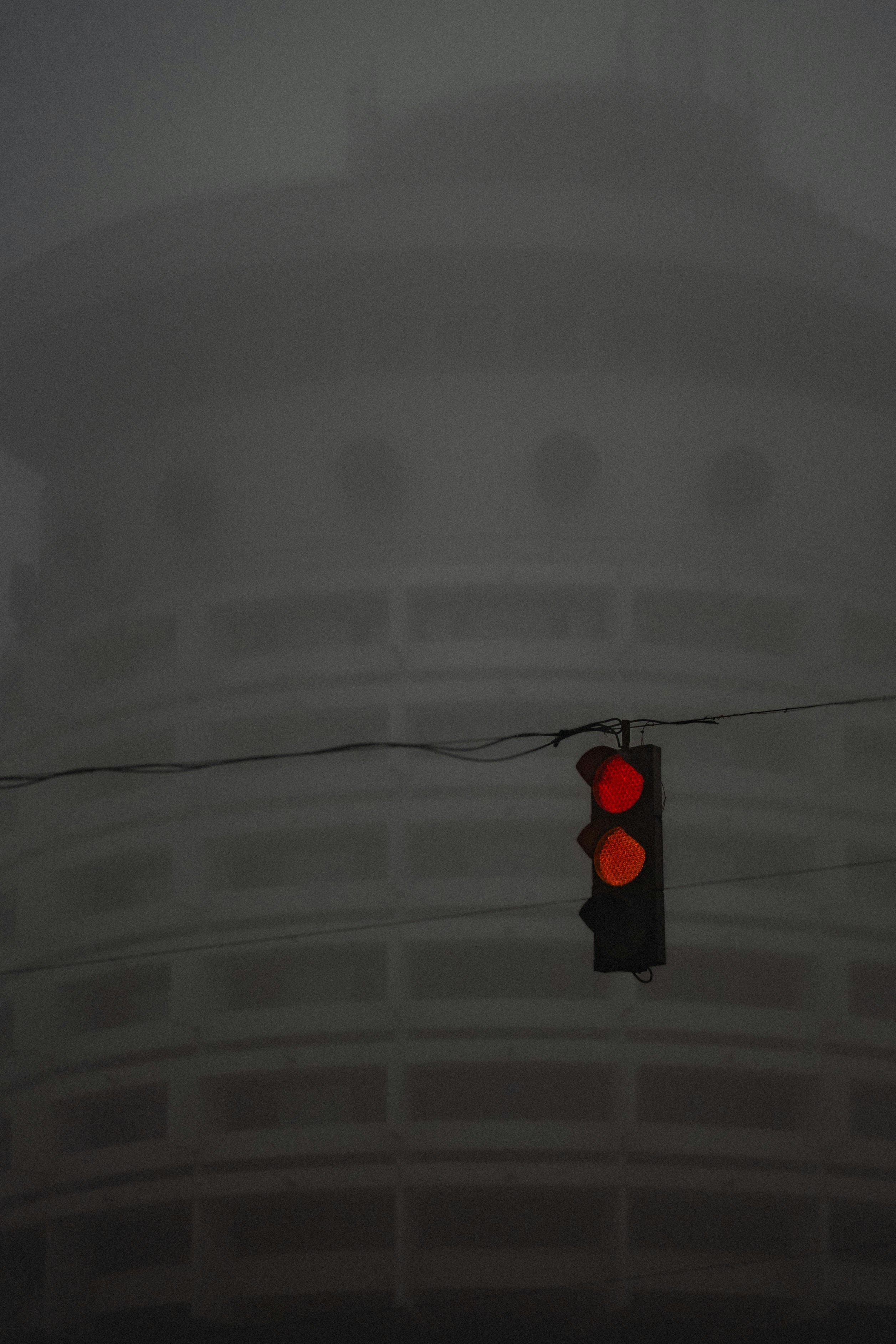 a stop light on a rainy day