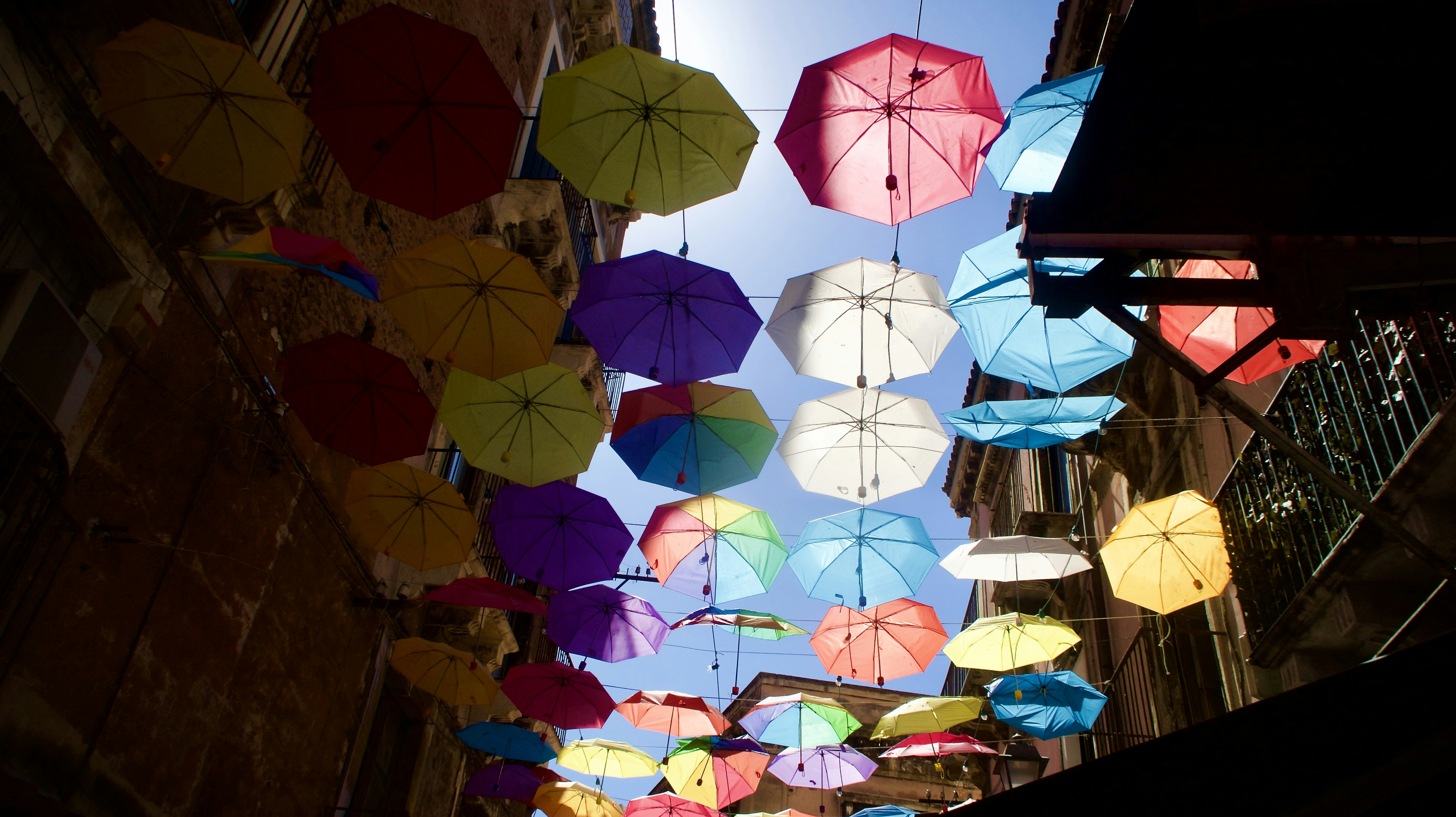 A group of colorful umbrellas photo – Free Sicilian Image on Unsplash
