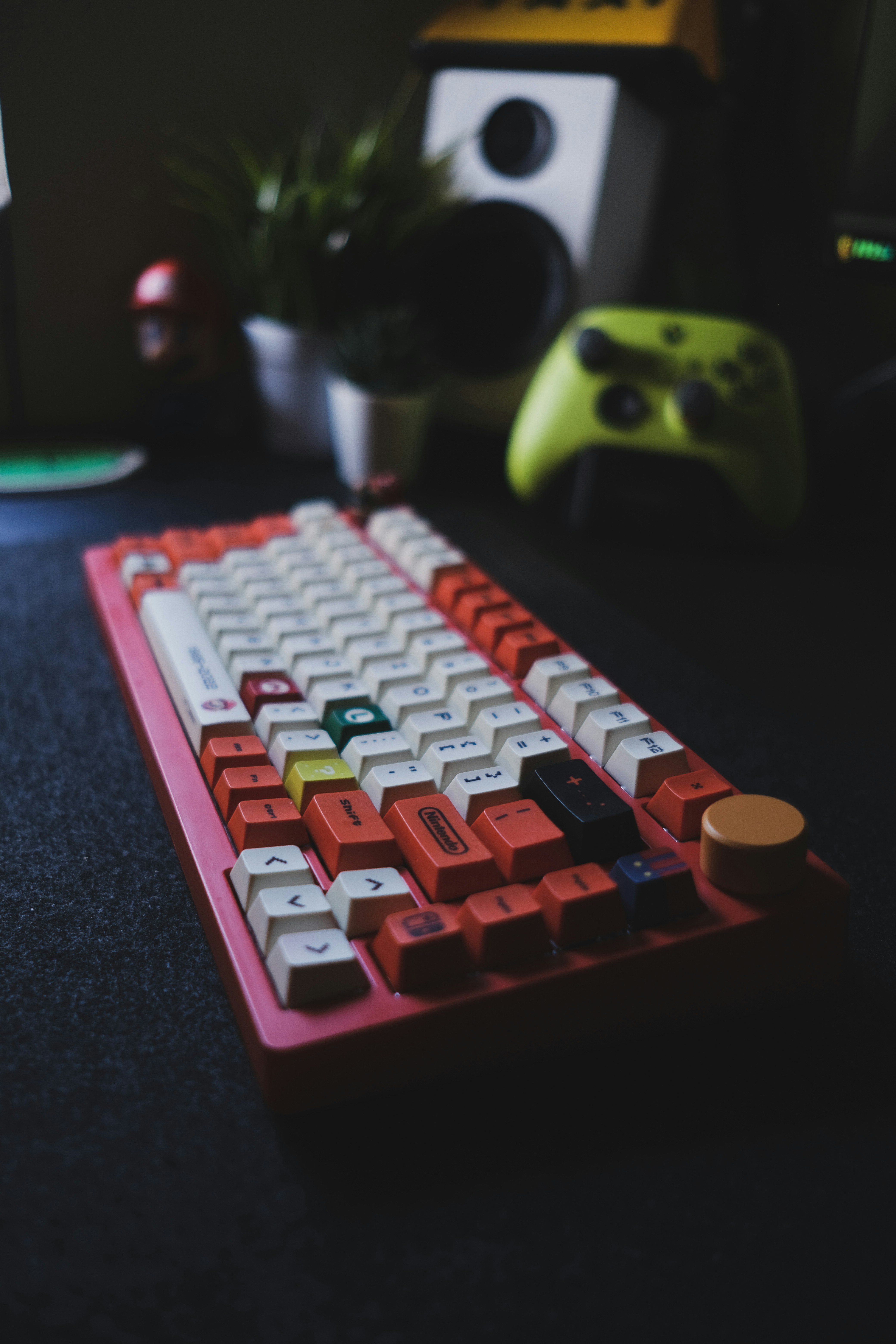 A red calculator with a green controller on top photo – Free Computer ...