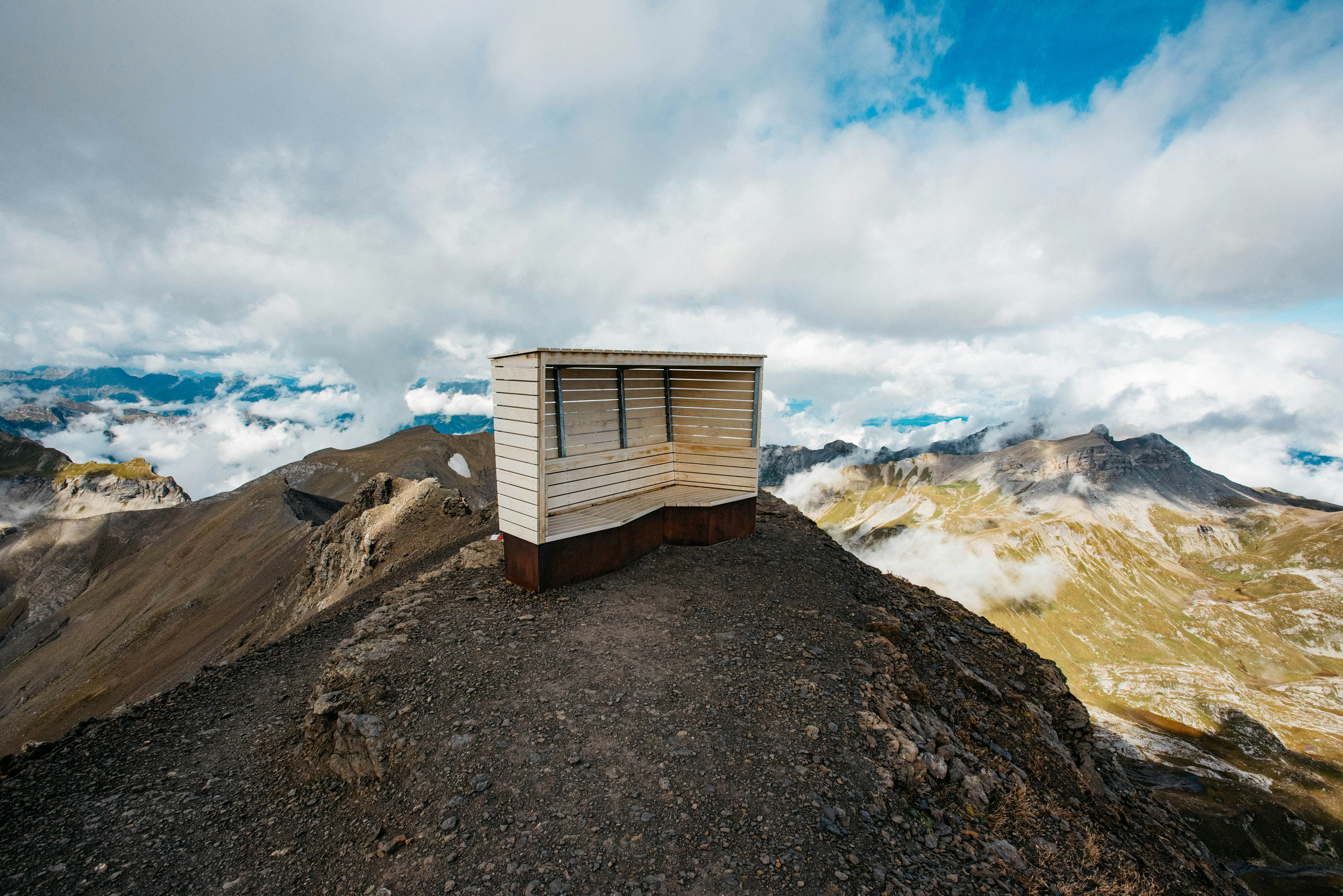 A building on a mountain photo – Free Nature Image on Unsplash
