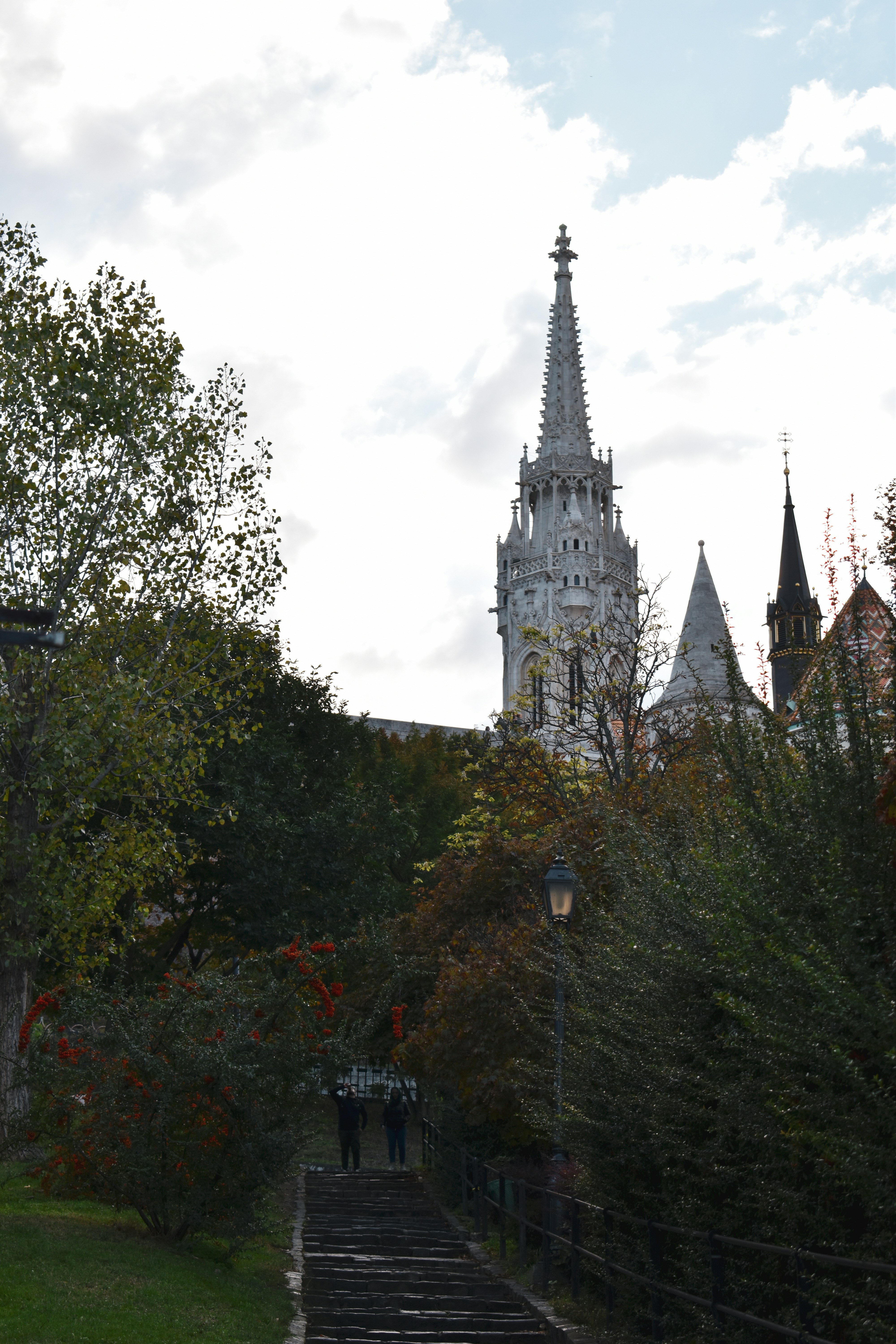 Gothic Spire Rising Above Seasonal Foliage