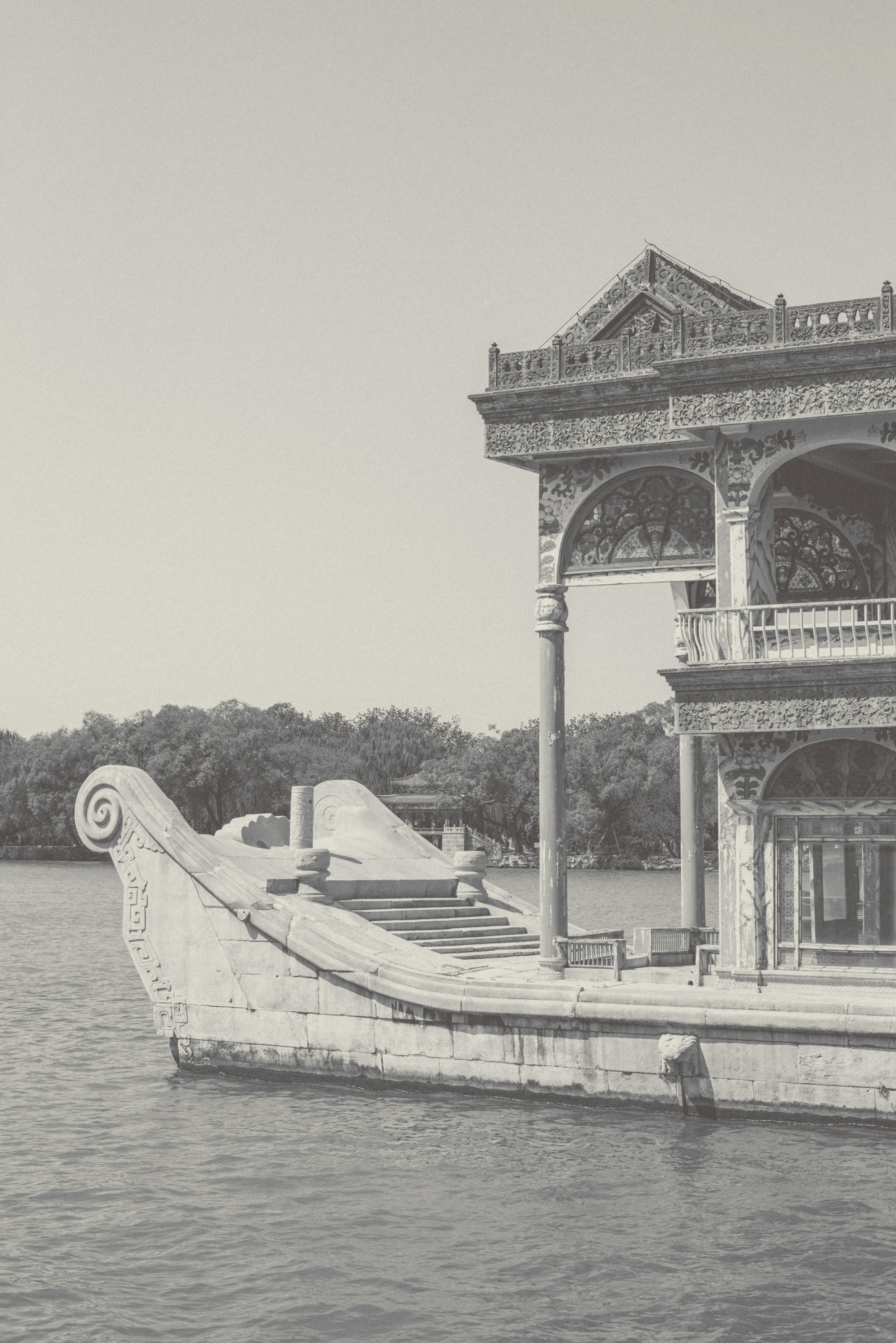 Floating Lakeside Pavilion in Sepia Light: Arched Veranda Over Calm Water