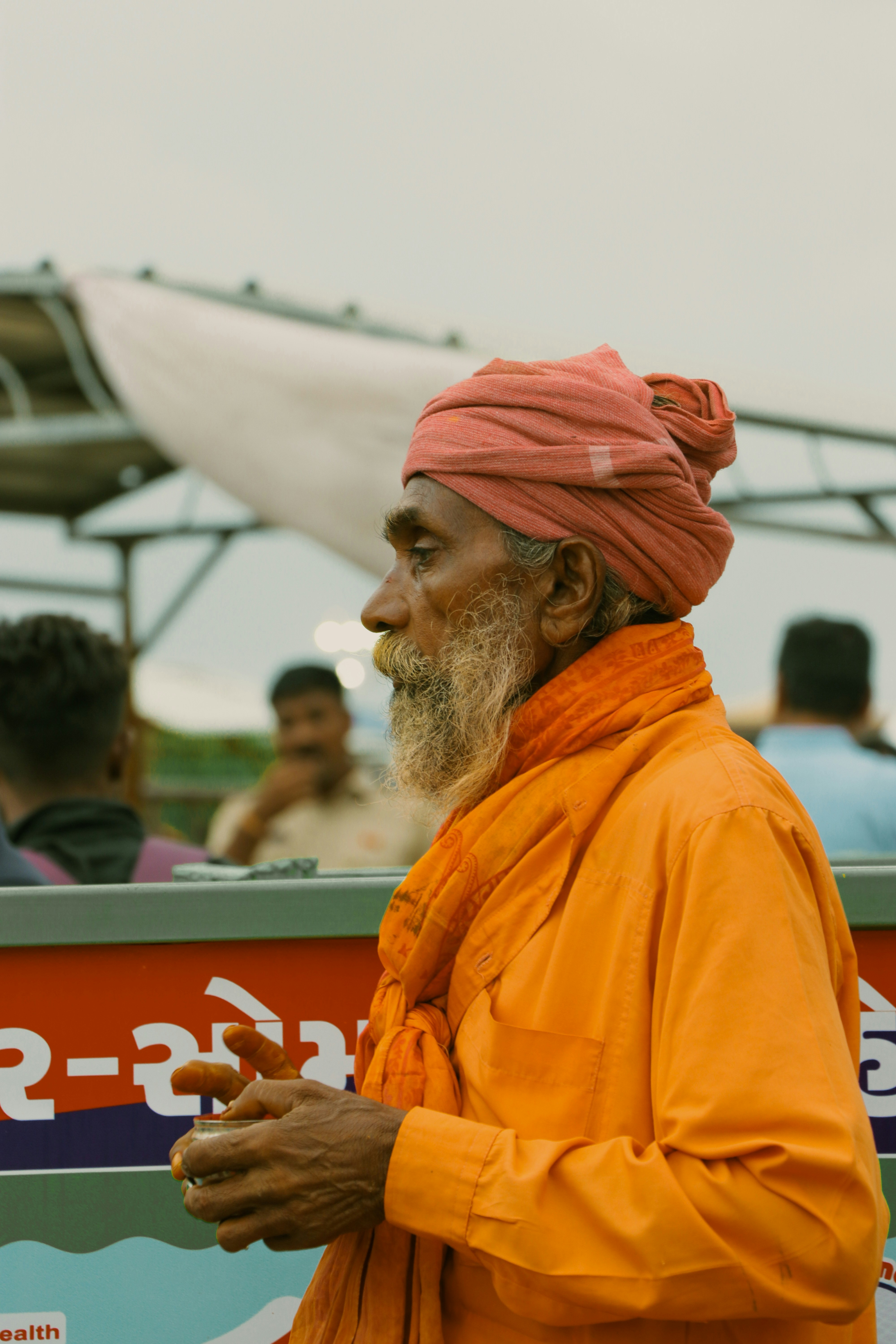 a man in an orange jacket