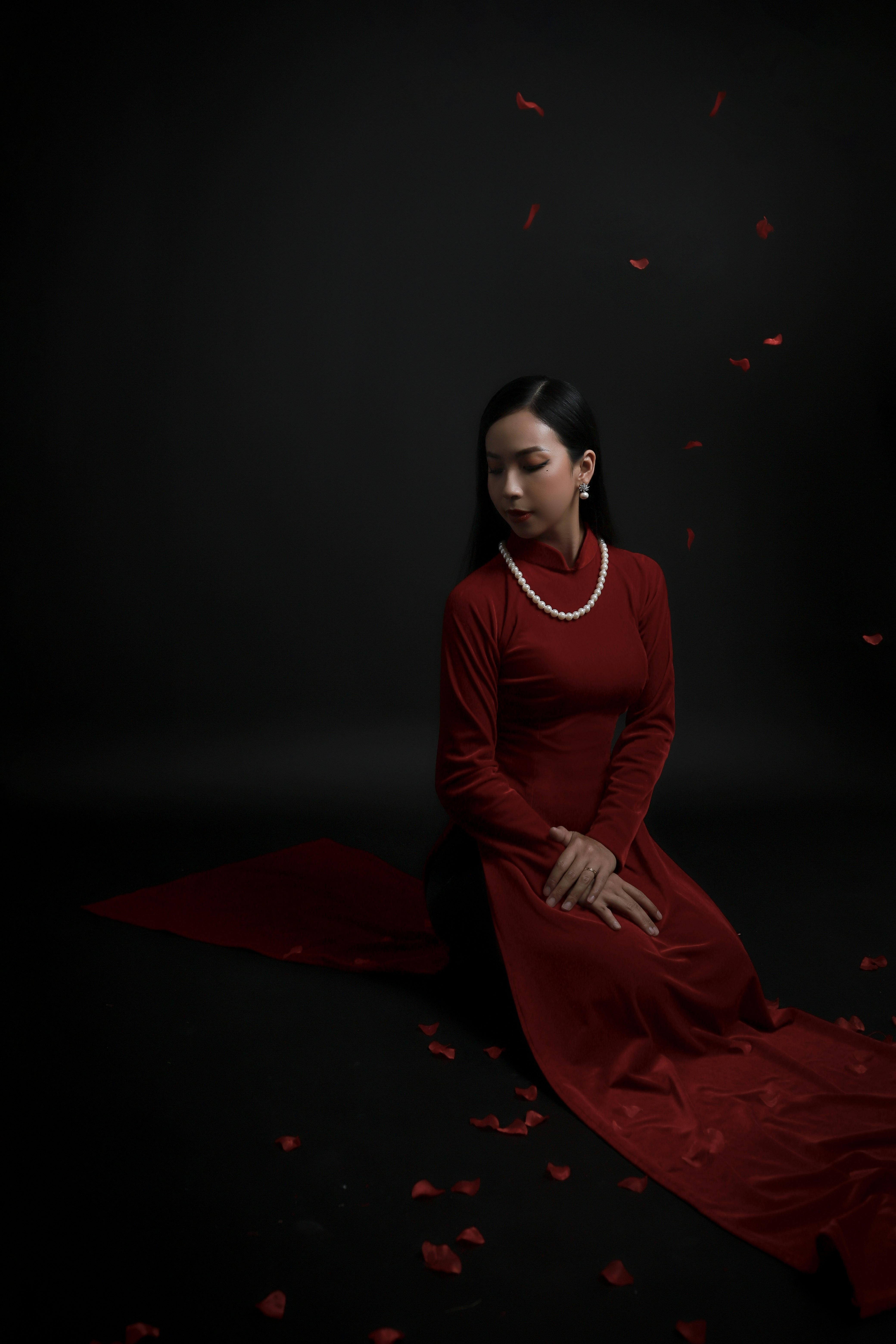 Crimson Velvet Quiet: A Portrait of Poise in Evening Light