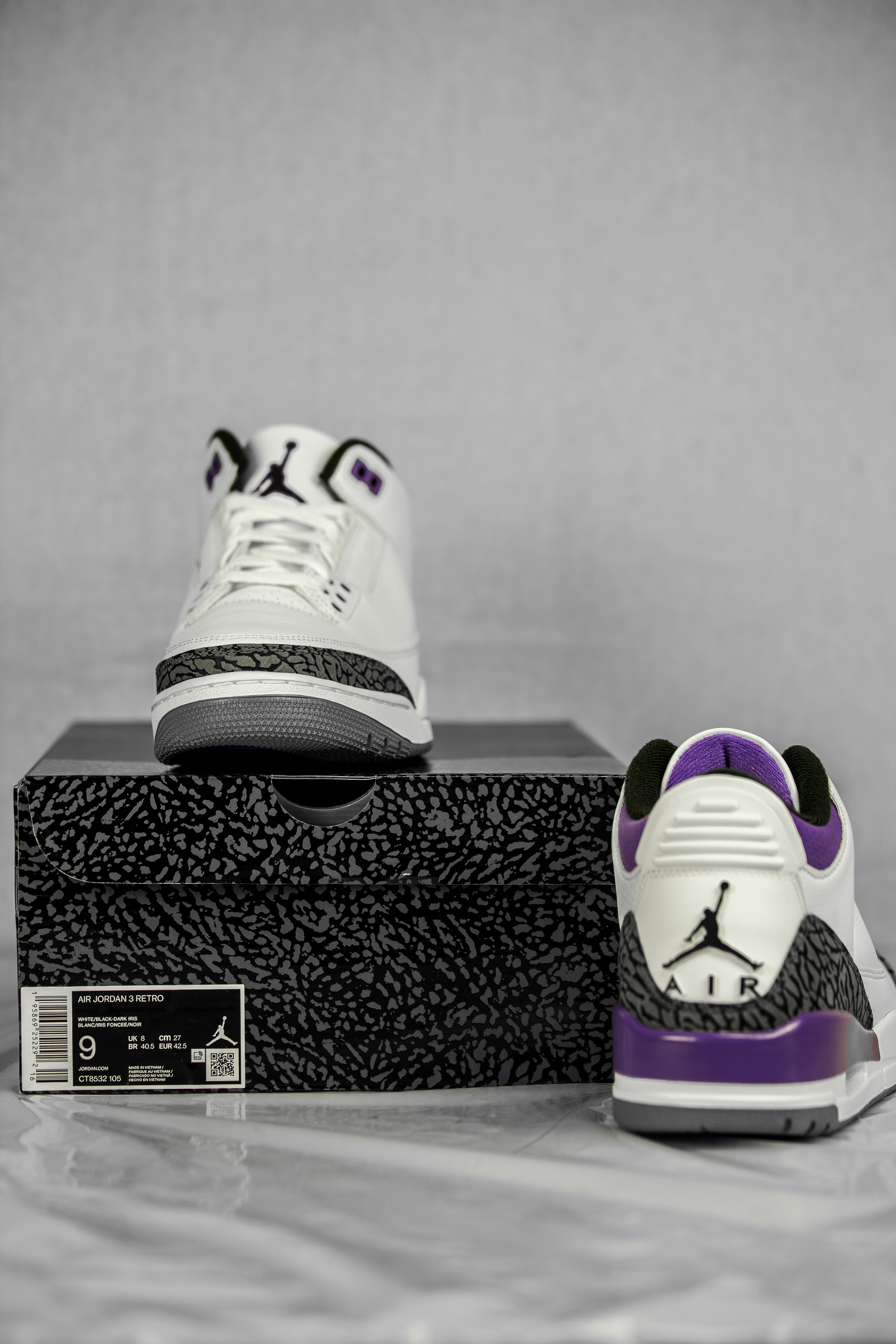 A pair of shoes on a table photo – Free Grey Image on Unsplash